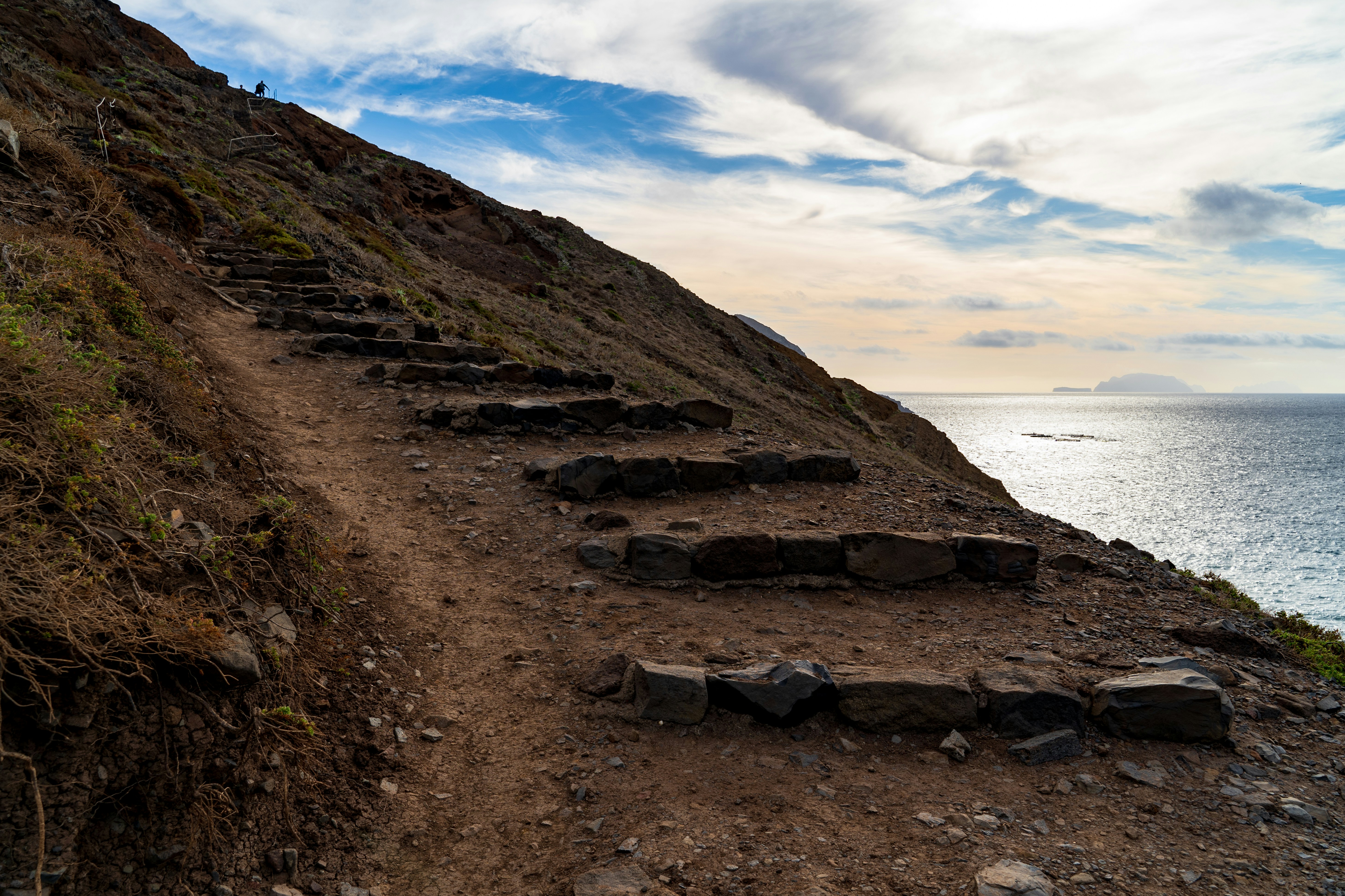 Cliffside Stone Steps Toward the Sea at Sunset