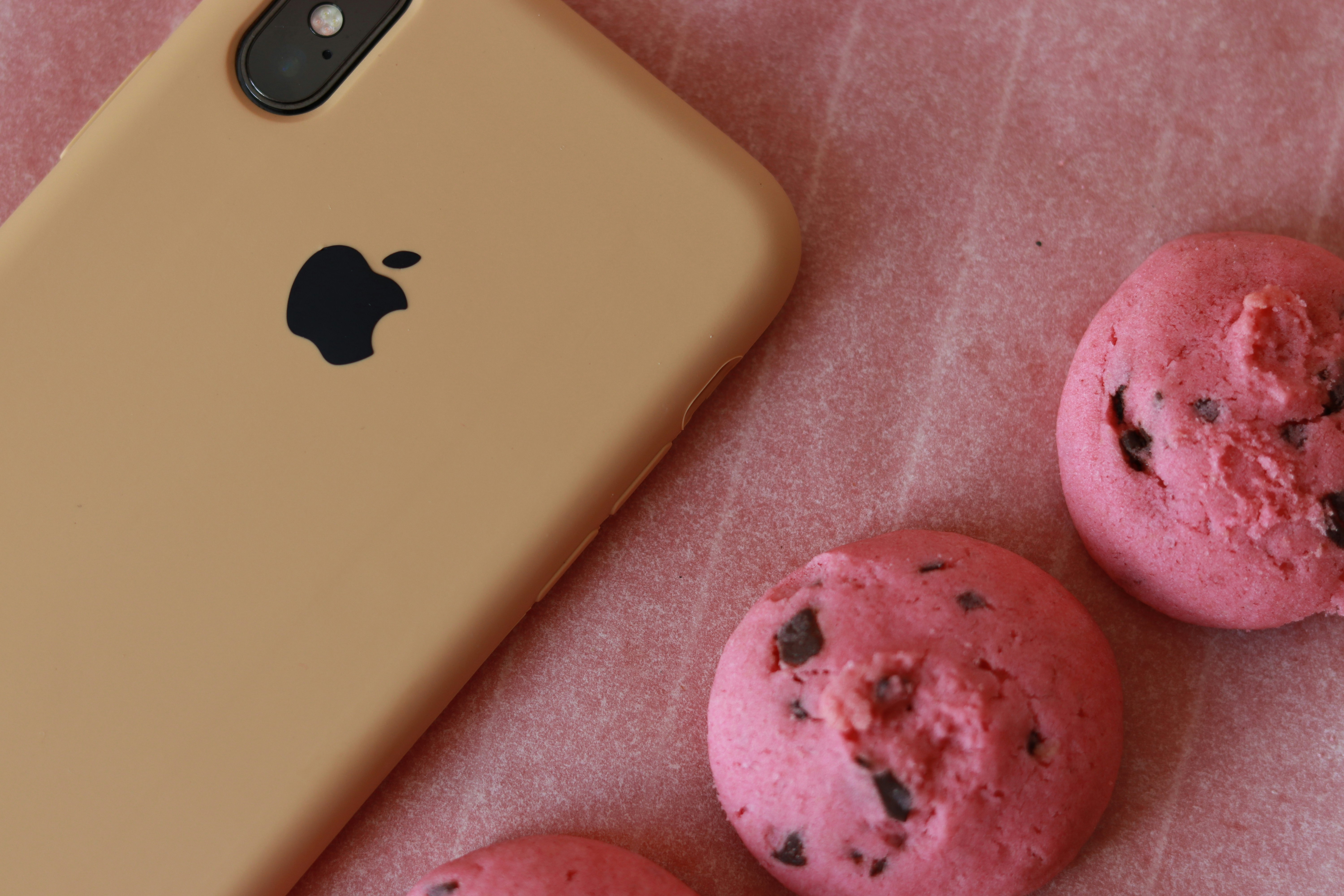 Gilded iPhone Meets Blush Macarons on Velvet Pink Fabric