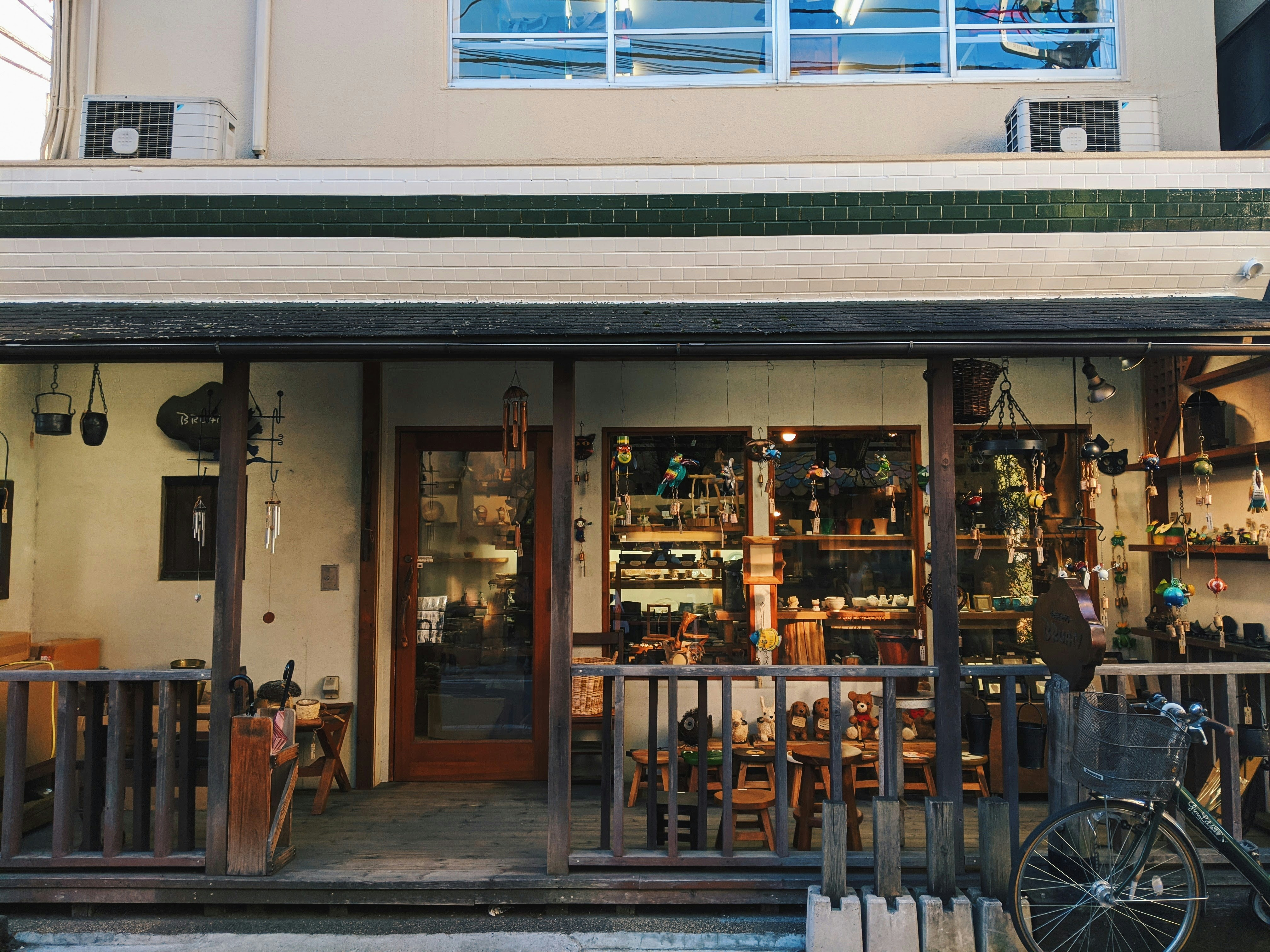 People sitting on bench in front of store during daytime photo – Free ...