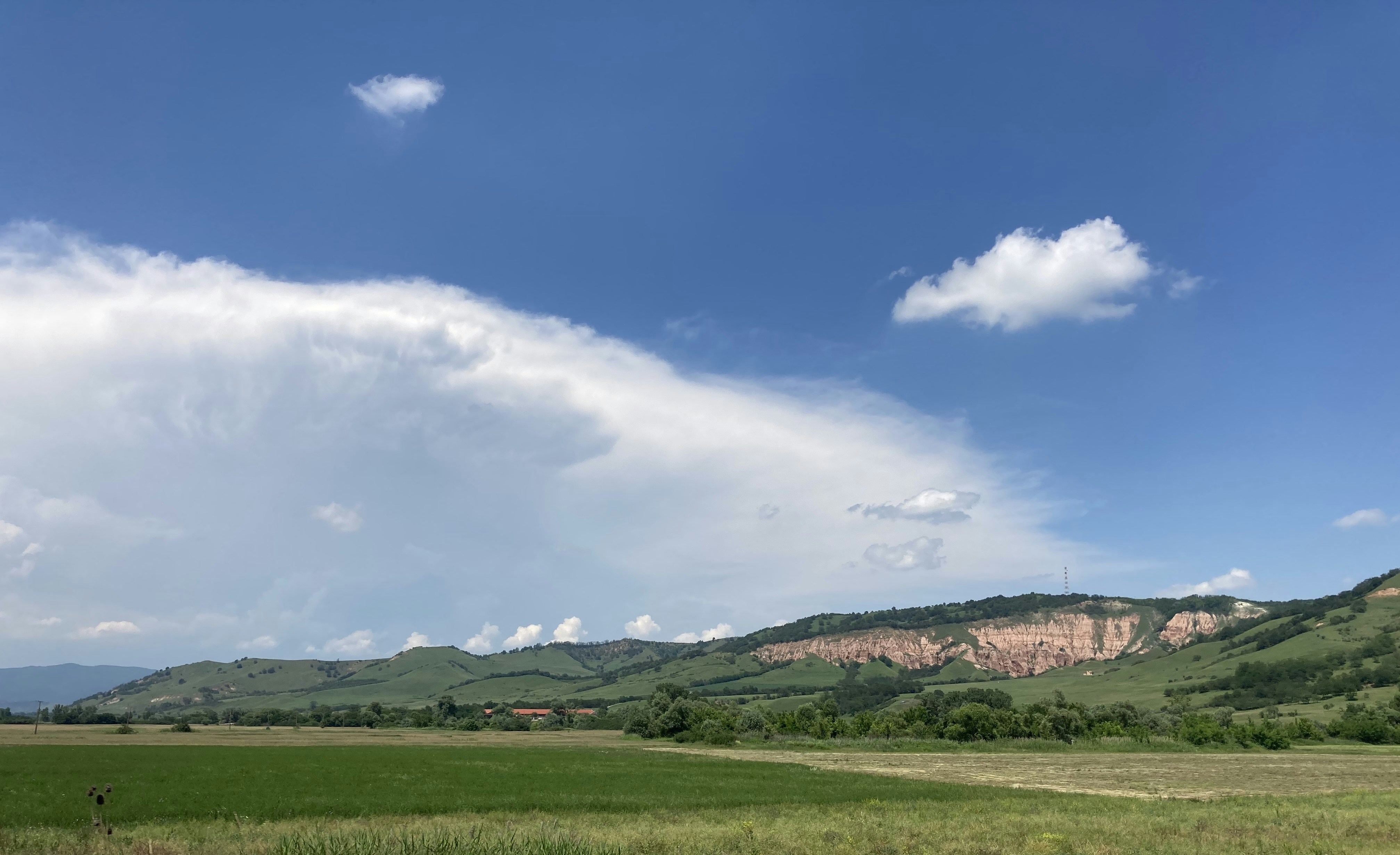 Verdant Plain and Cliff-Rim Horizon