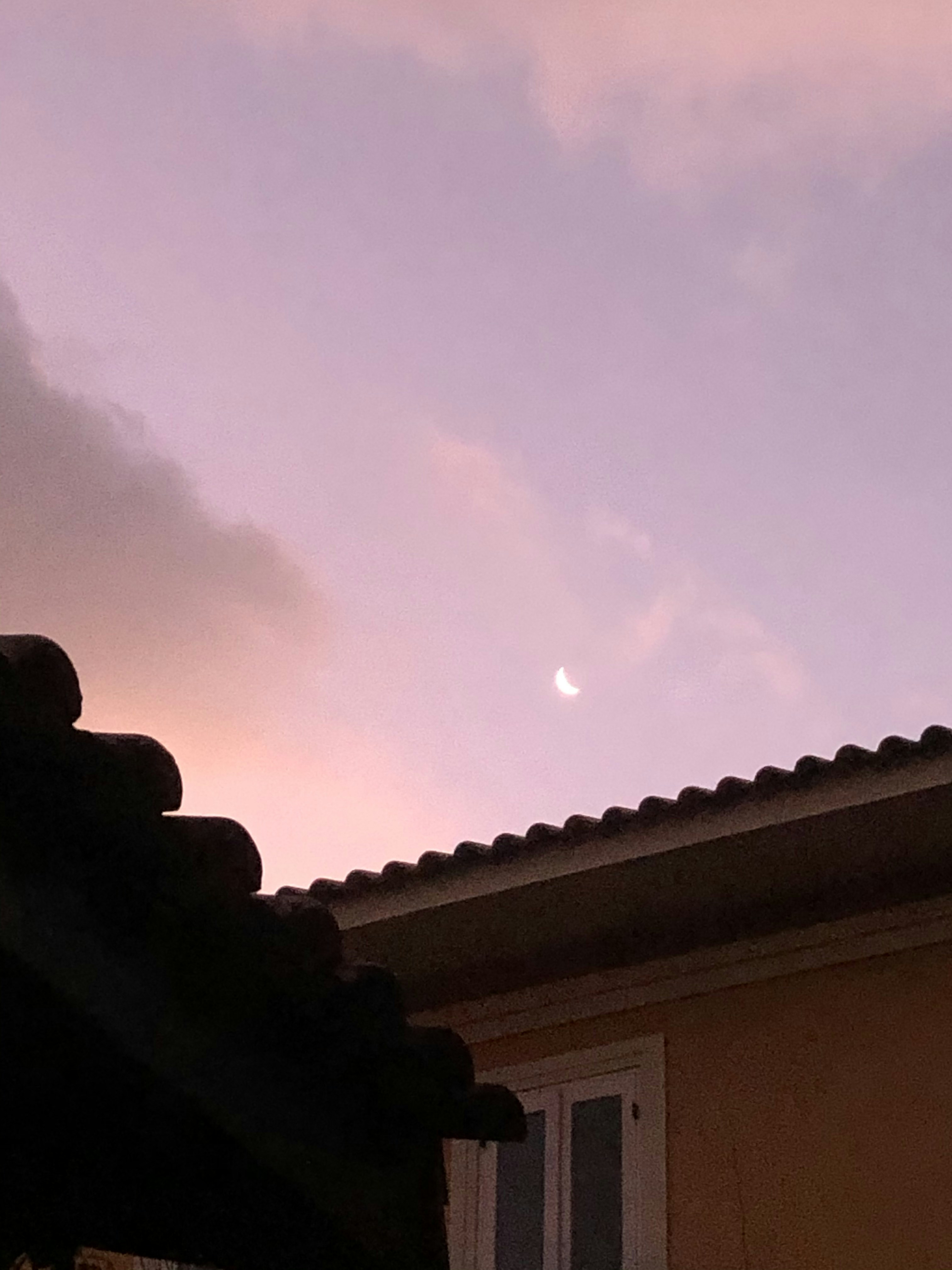 Crescent over Clay Tiles: Dusk Rooftops