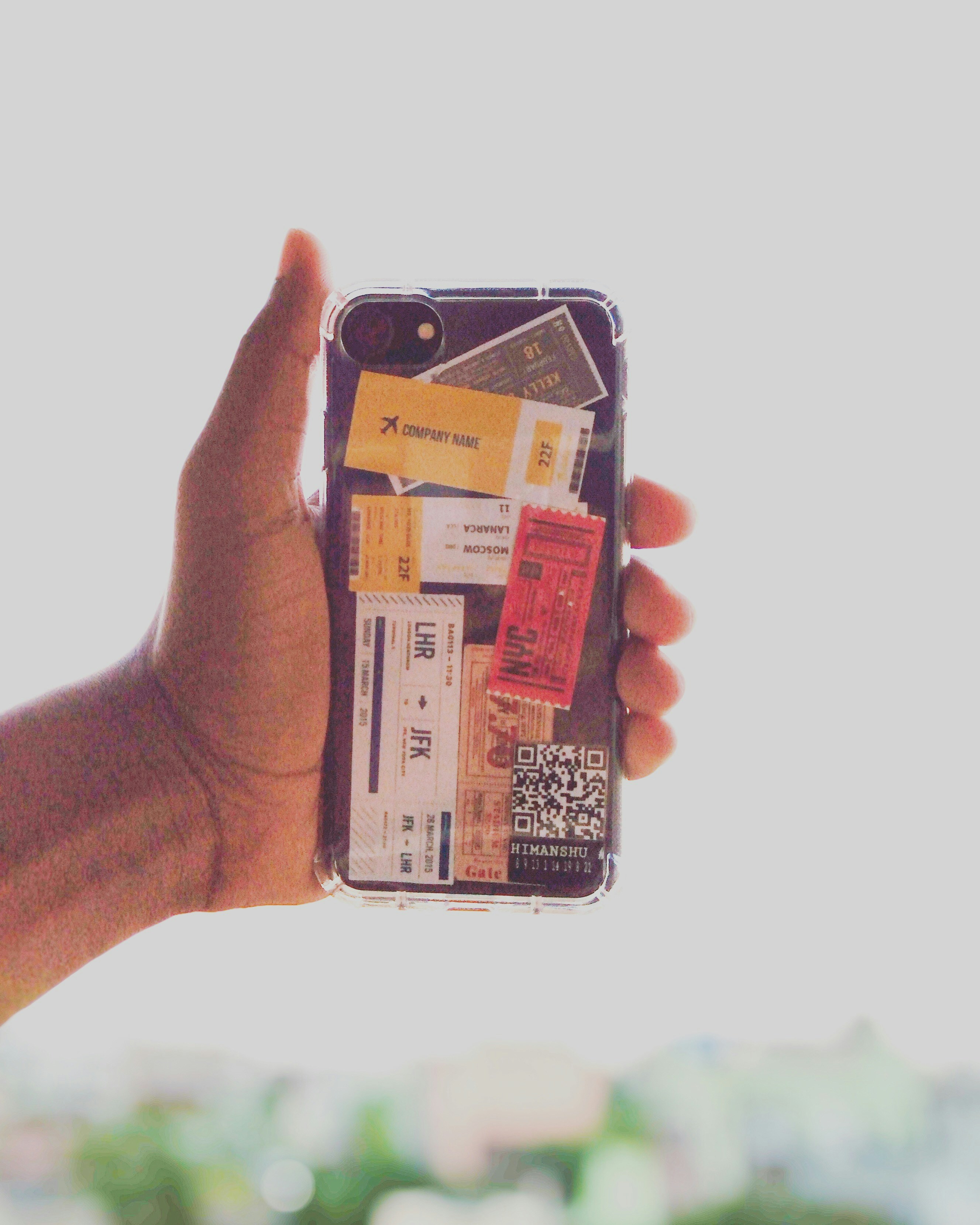 Card Cache in Hand: Wallet-Case Portrait Under Bright Light