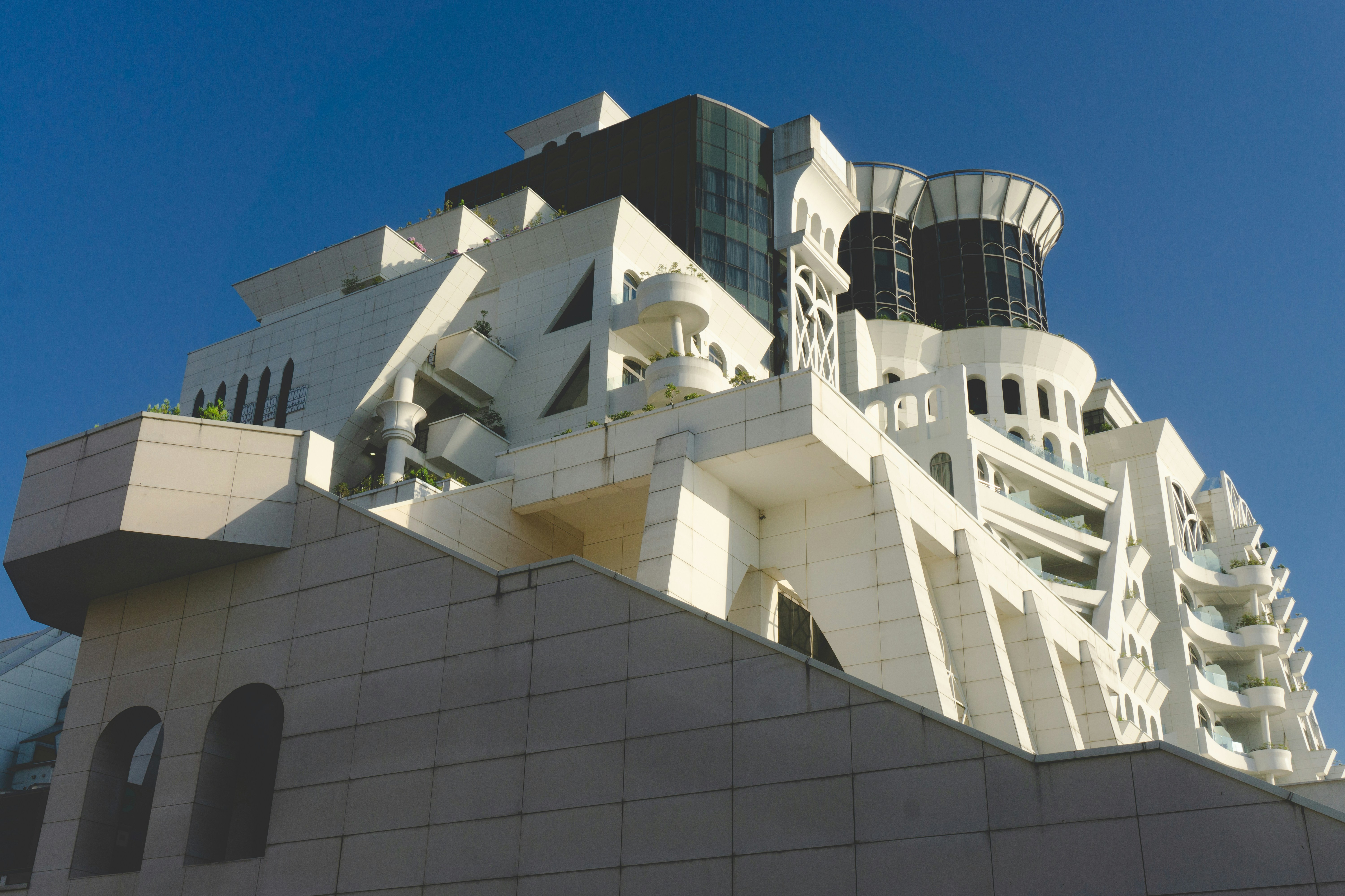 White concrete building under blue sky during daytime photo – Free ...