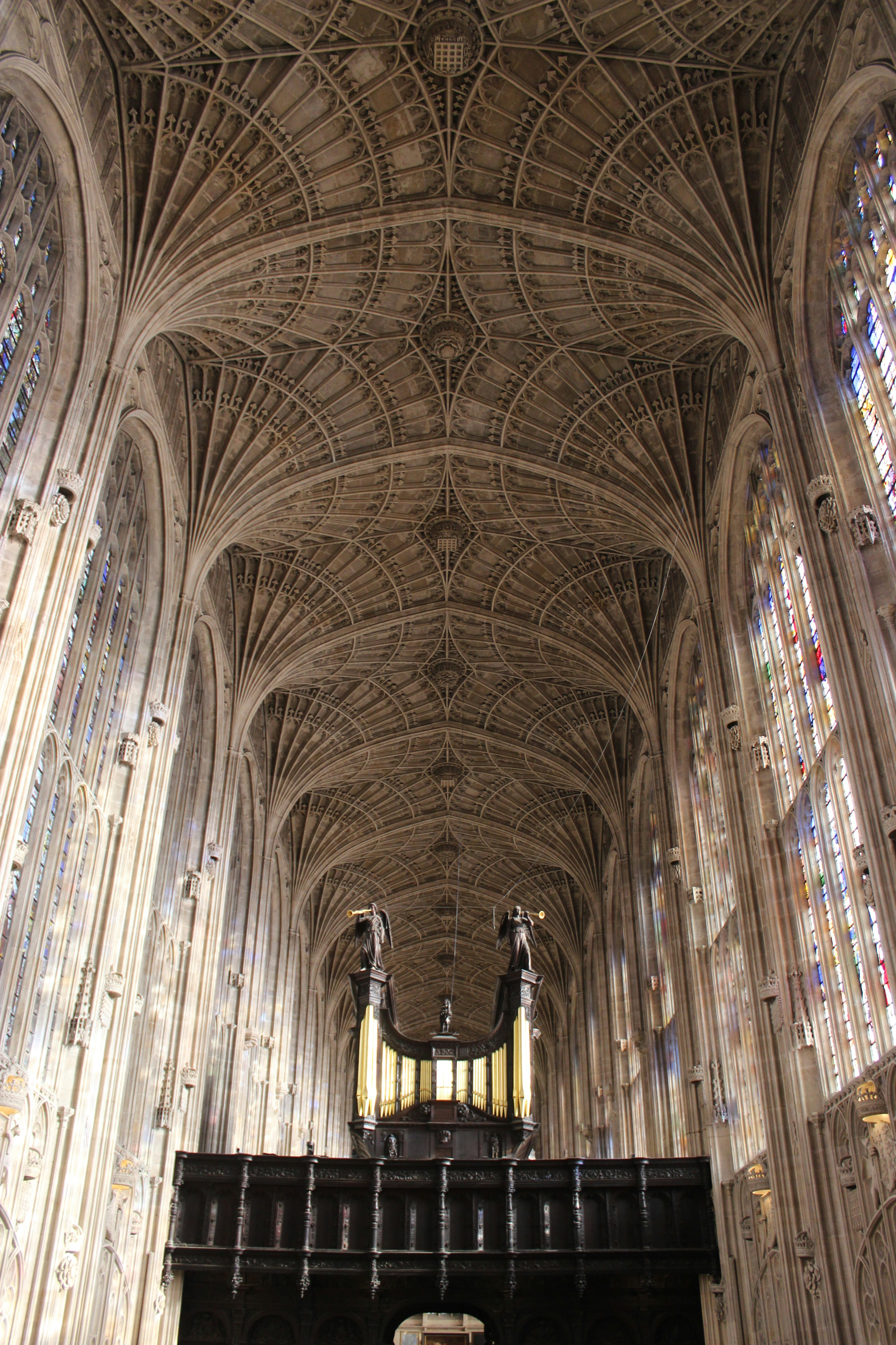 People walking inside brown and gray concrete building photo – Free ...