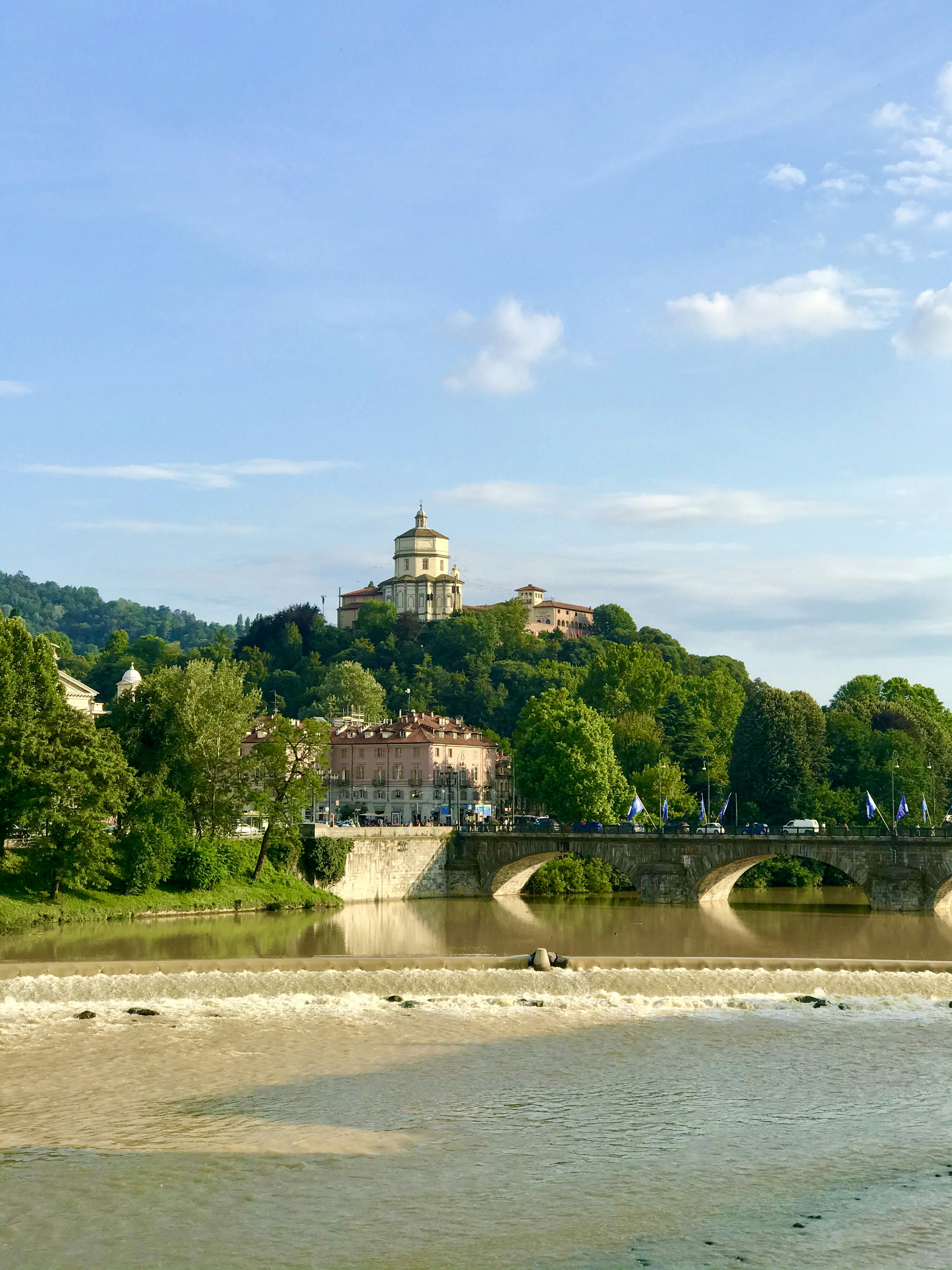 Hilltop Cathedral Over the River: A Riverside Vista