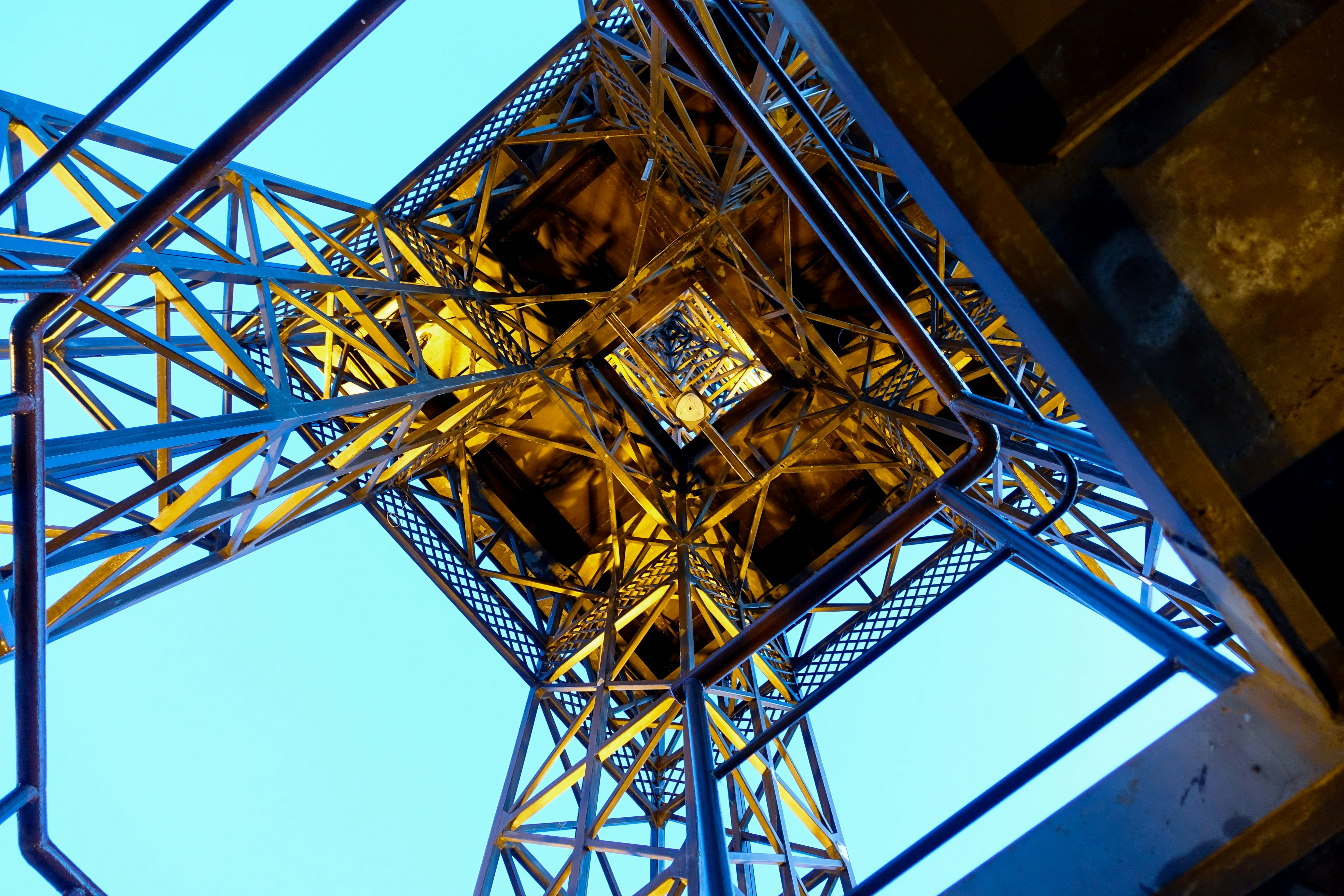 brown metal tower under blue sky during daytime