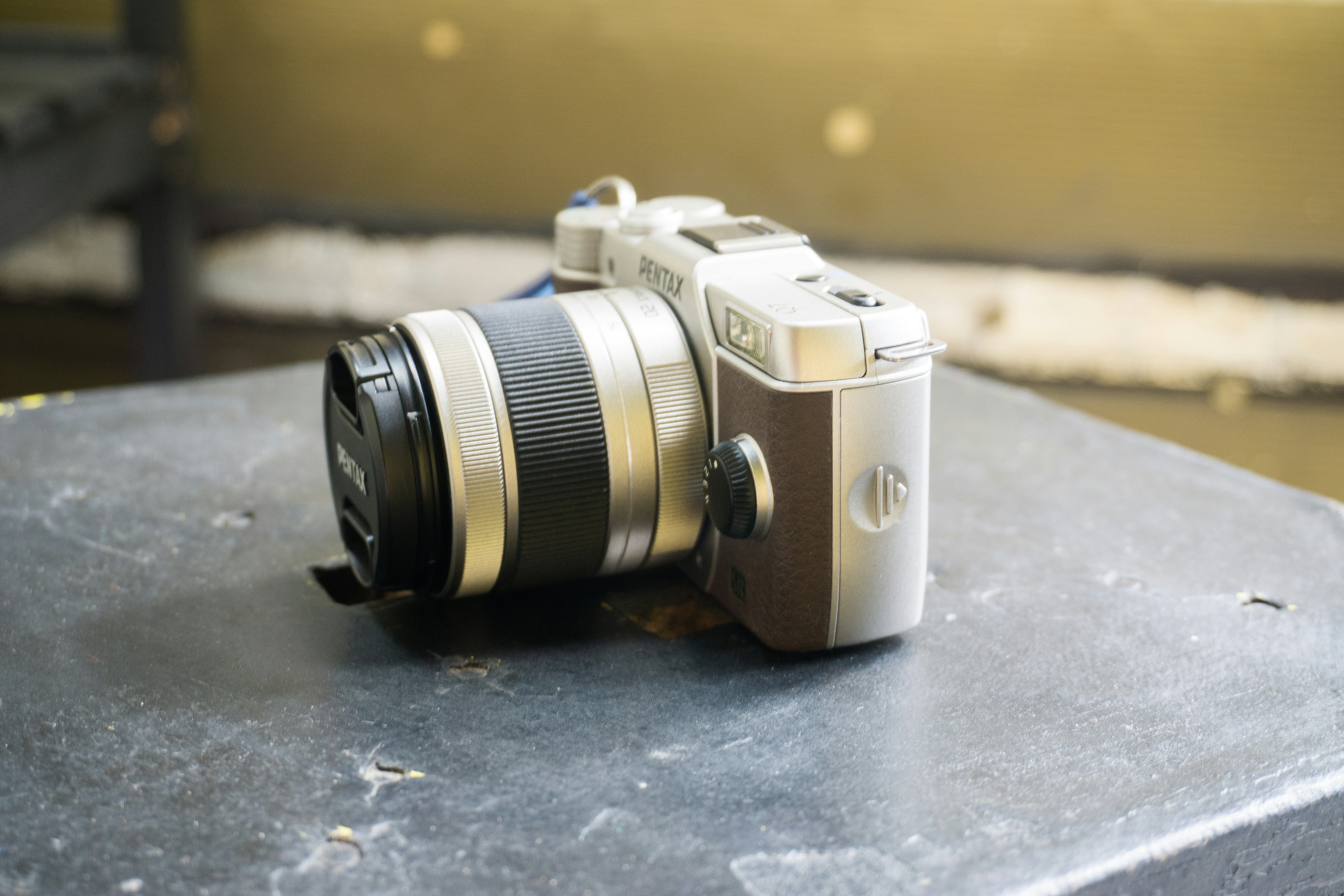 Silver and black dslr camera on gray concrete floor photo – Free Camera ...