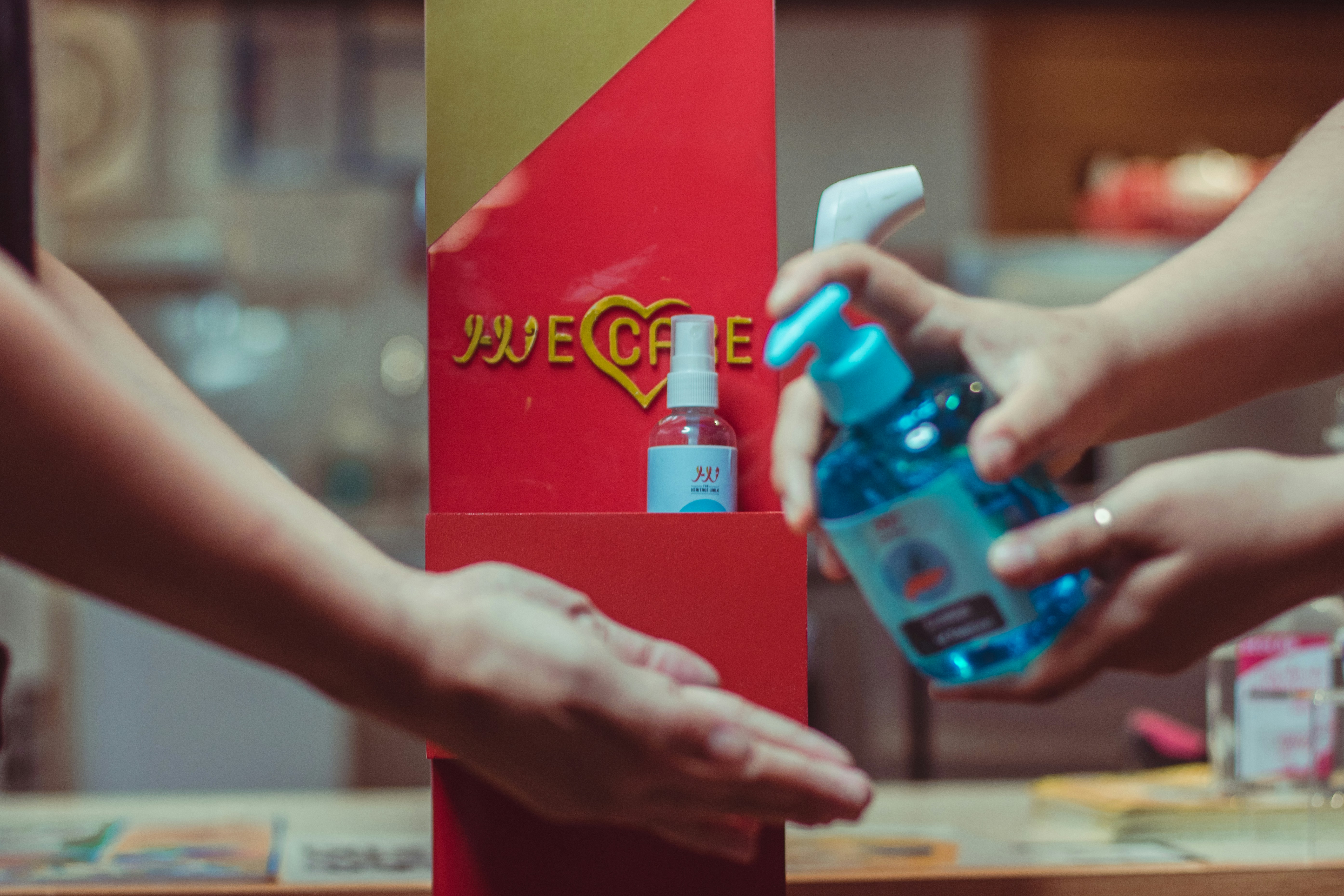 Handshake at the Toyshelf: A Splash of Blue and Neon Red