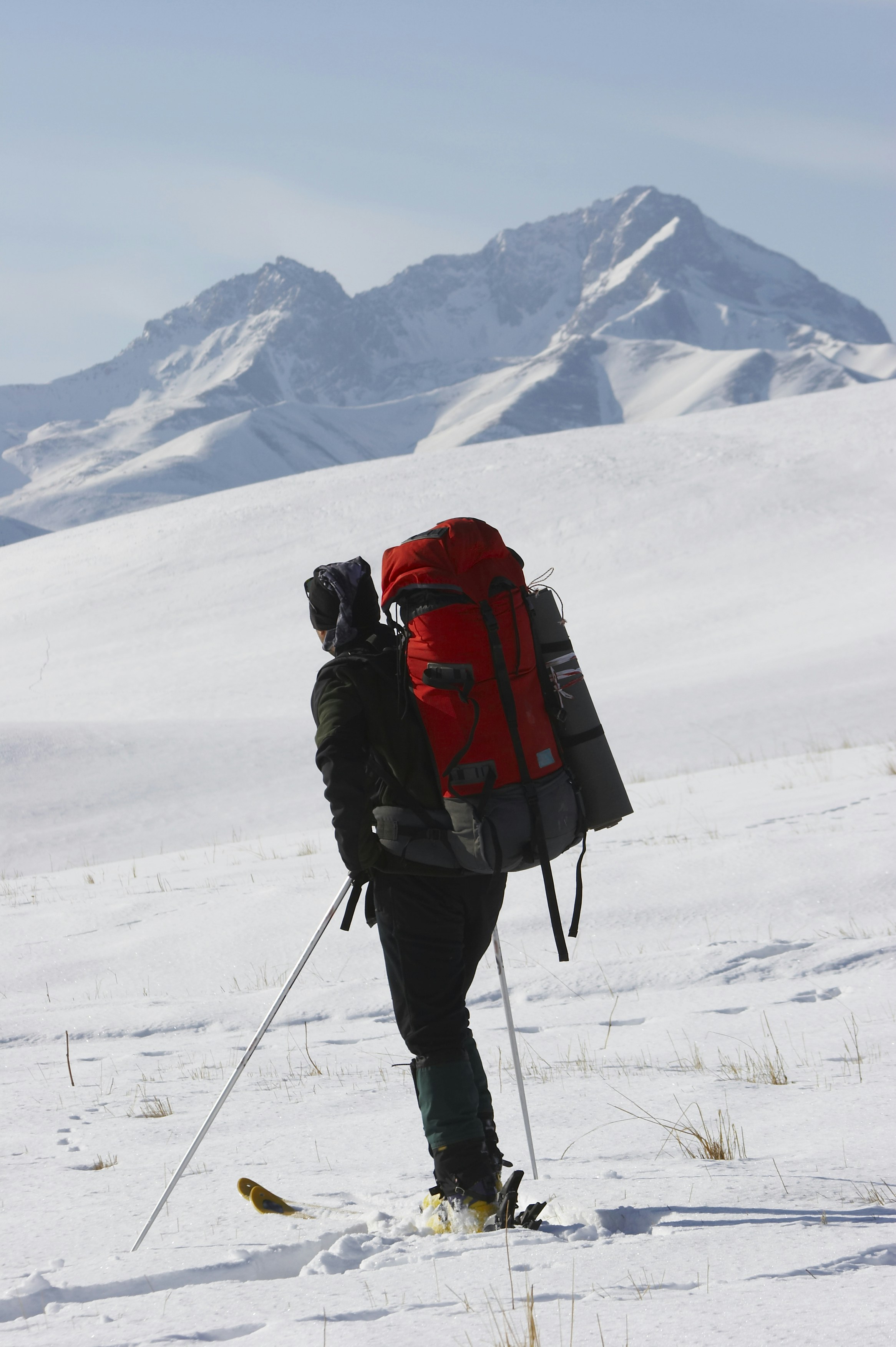 Glacial Ascent: A Mountaineer Carves a Path Through Winter Silence
