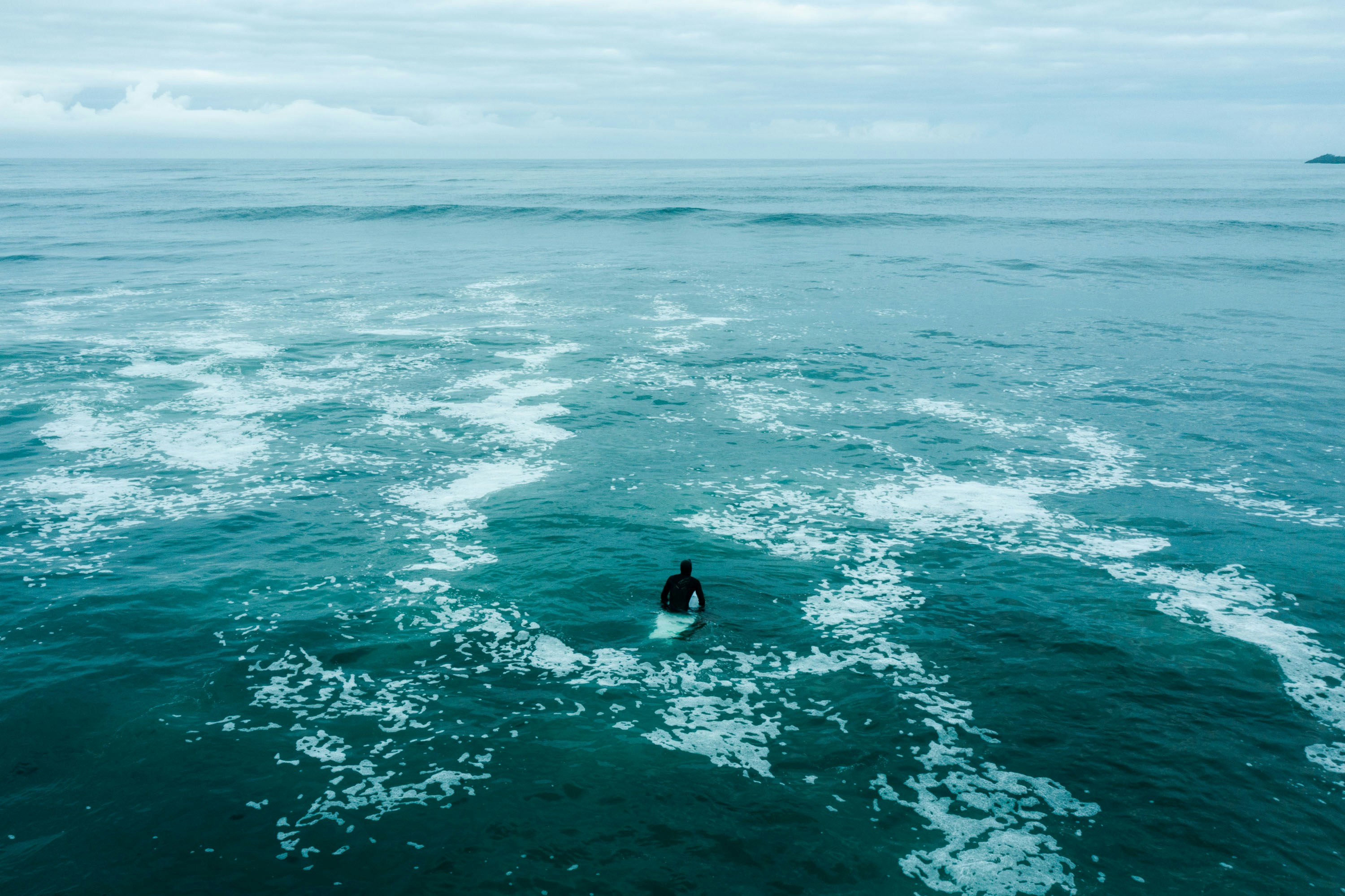 THE OCEAN IS NOT THE ONLY ONE SEARCHING | person surfing on sea waves during daytime