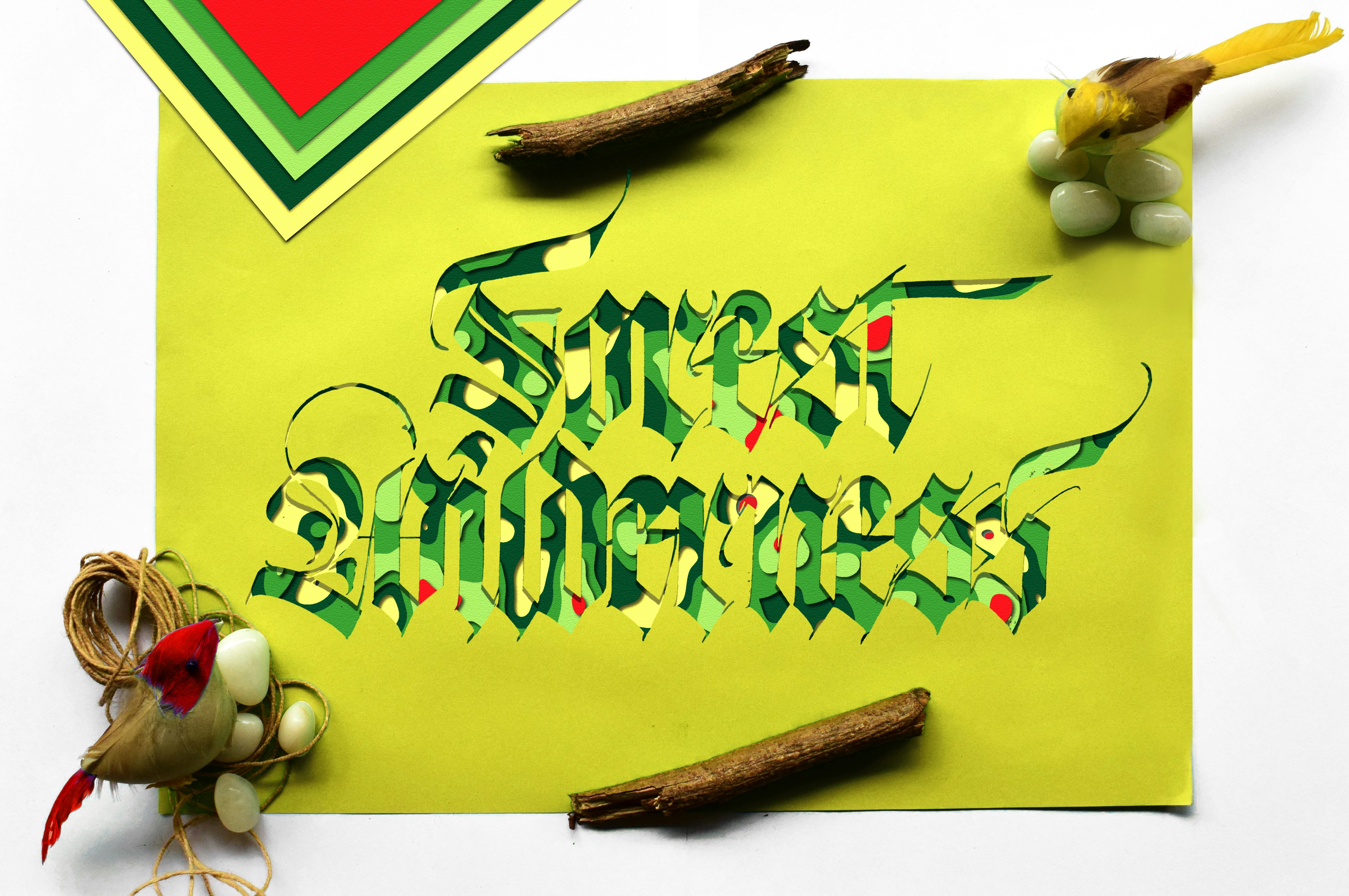 Vibrant green background featuring intricate calligraphy spelling 'Forest Abundance,' accompanied by decorative elements like birds and twigs.