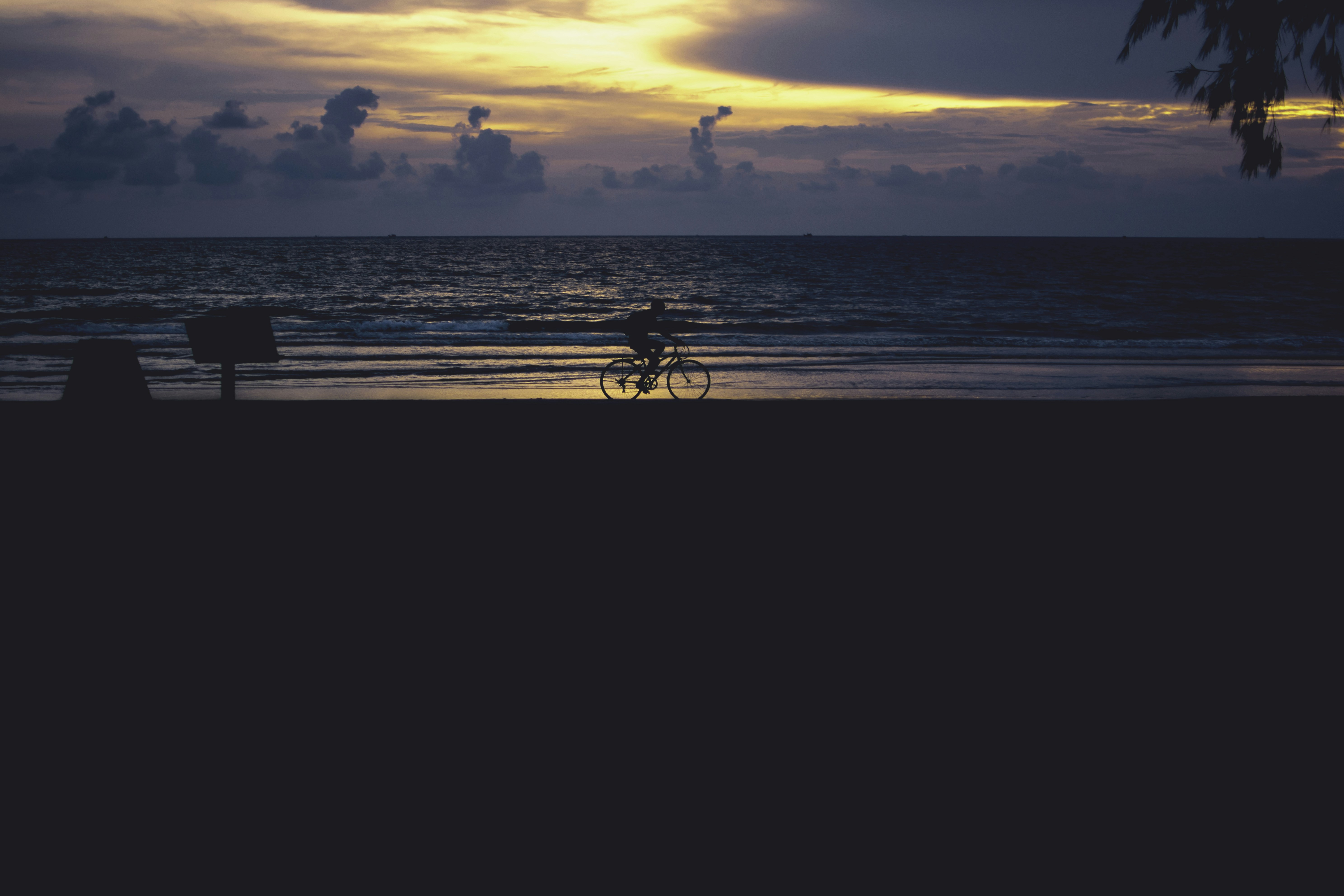 Silhouette Rider at Dusk along the Horizon