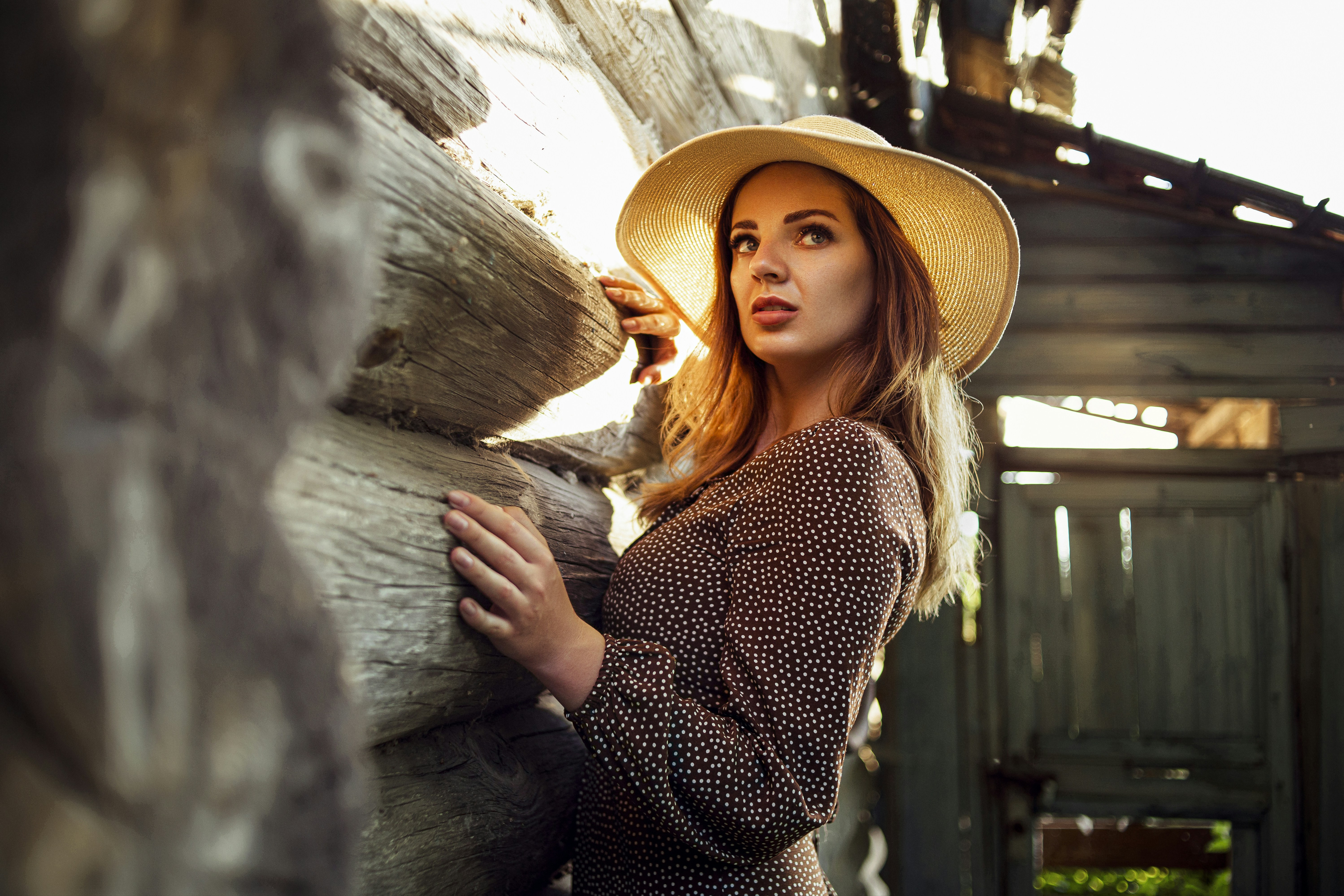 Woman in black and white polka dot long sleeve shirt wearing brown hat photo – Free Tver Image ...