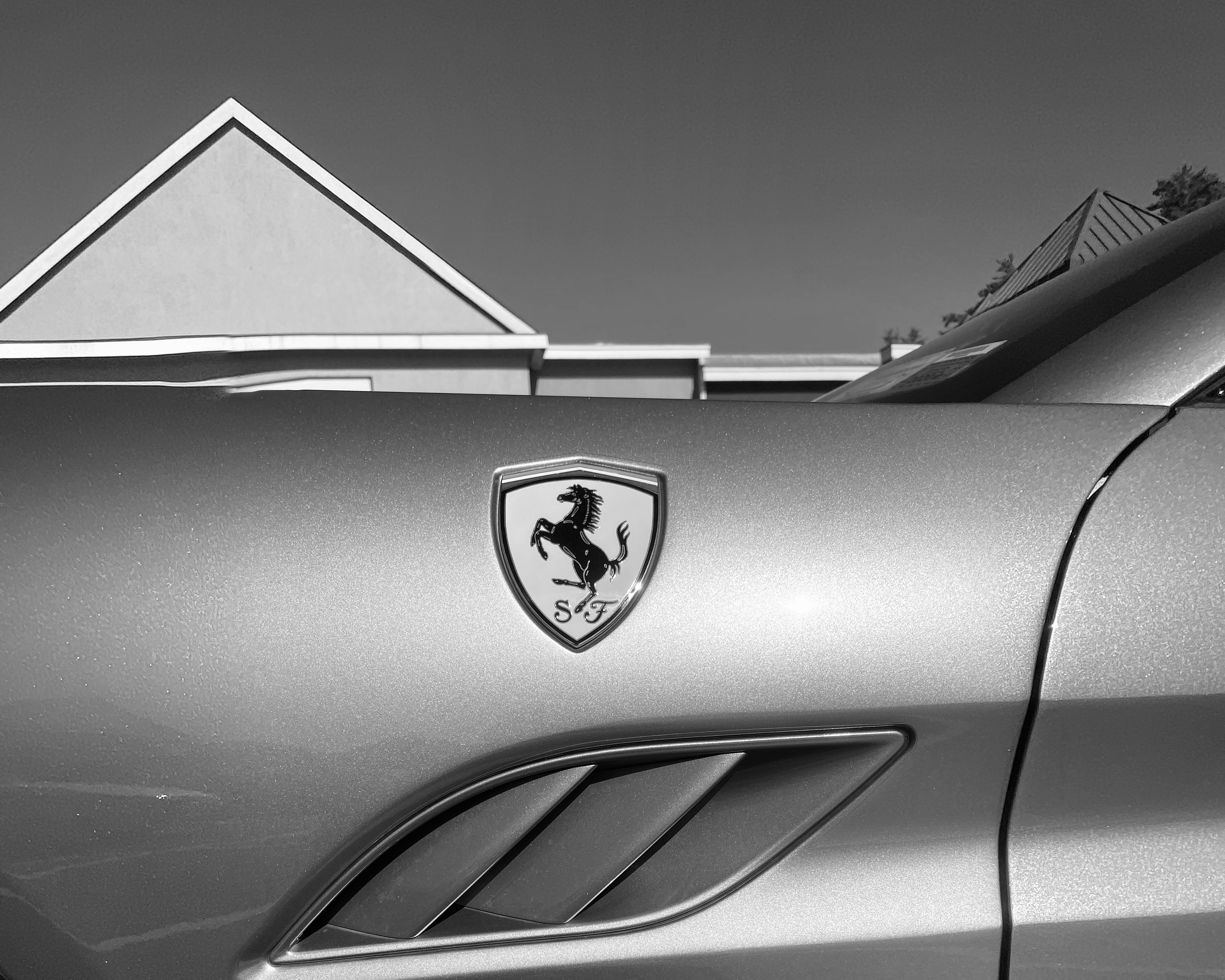 Grayscale photo of car with logo photo – Free Grey Image on Unsplash
