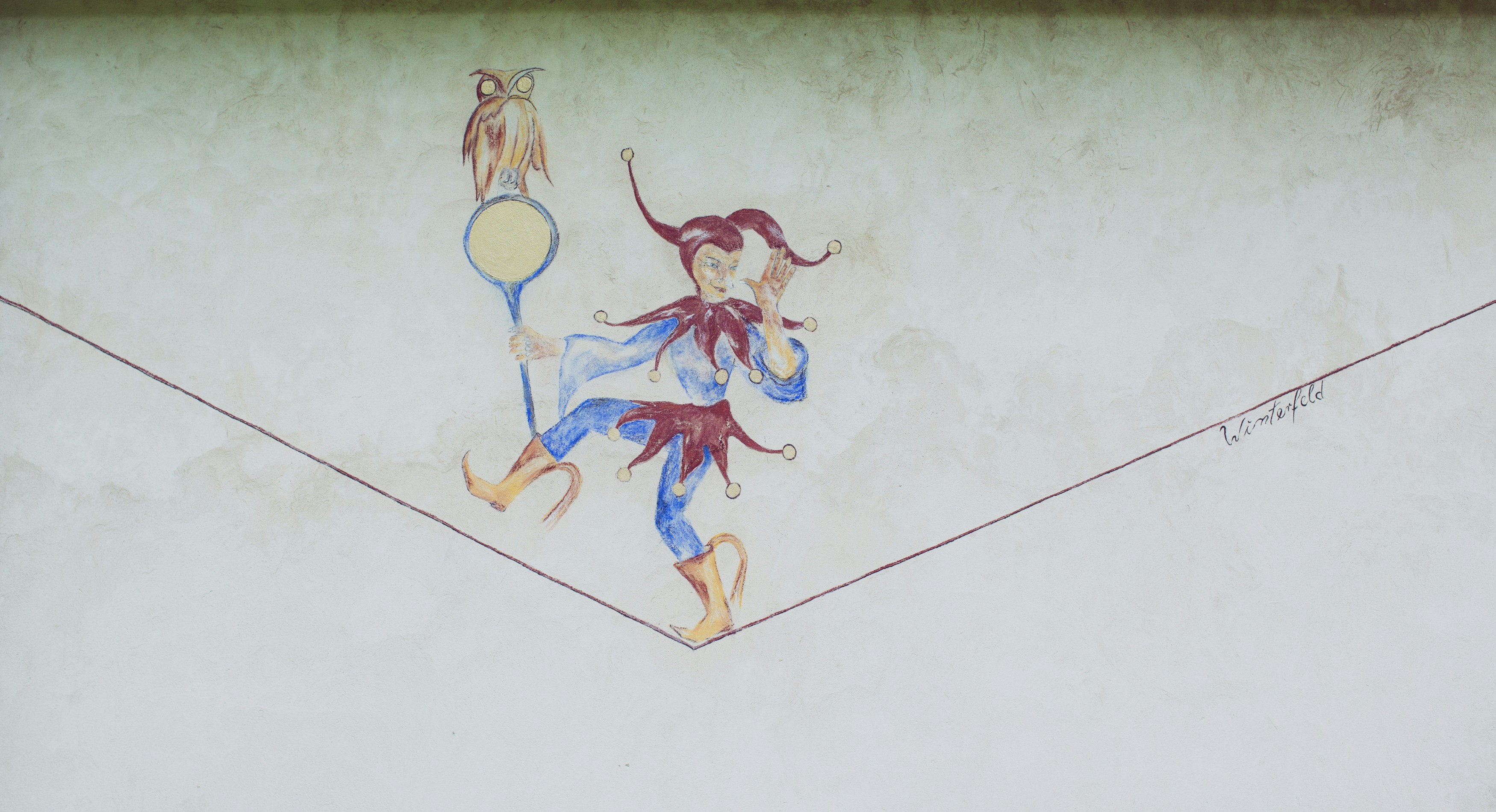 A whimsical jester balancing on a tightrope while holding a mirror, accompanied by an owl perched above. The playful illustration captures a moment of precarious fun.