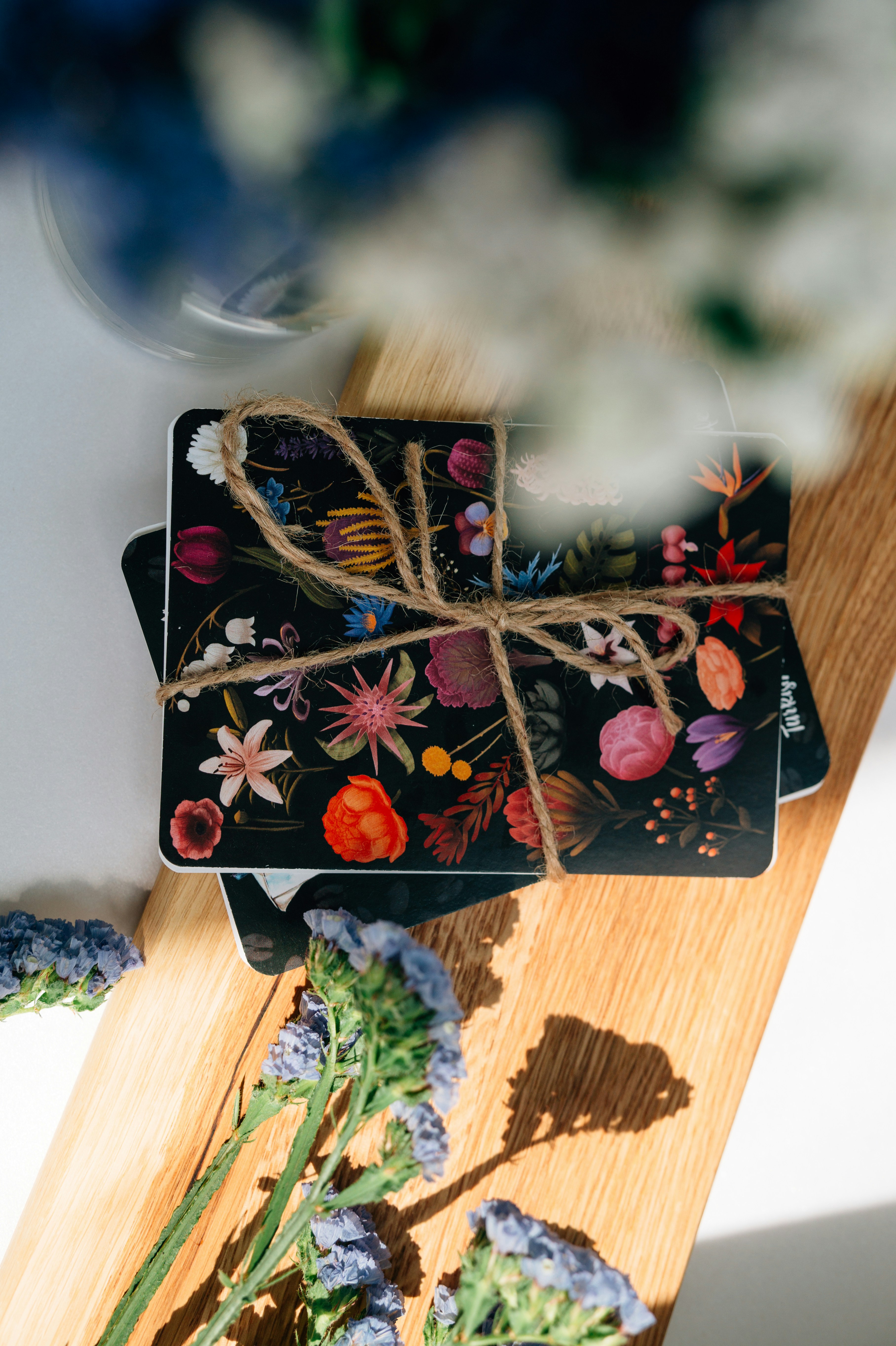 Gift Wrap of Flowers: A Creative Card Deck on a Wooden Slab