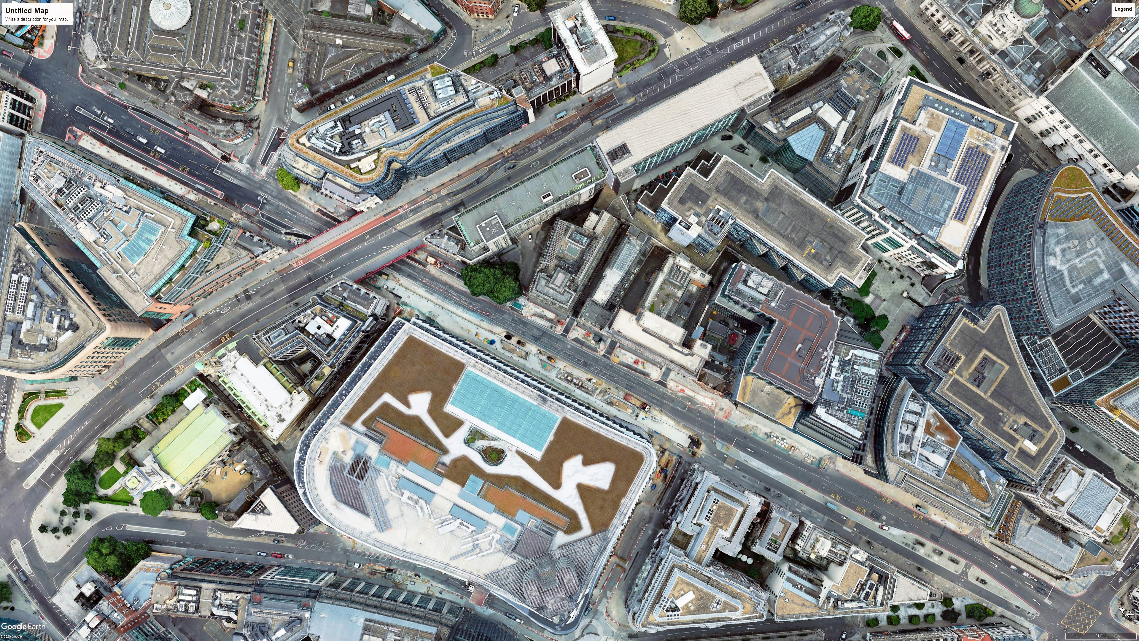 An aerial view of a city with lots of traffic photo – Free Building ...