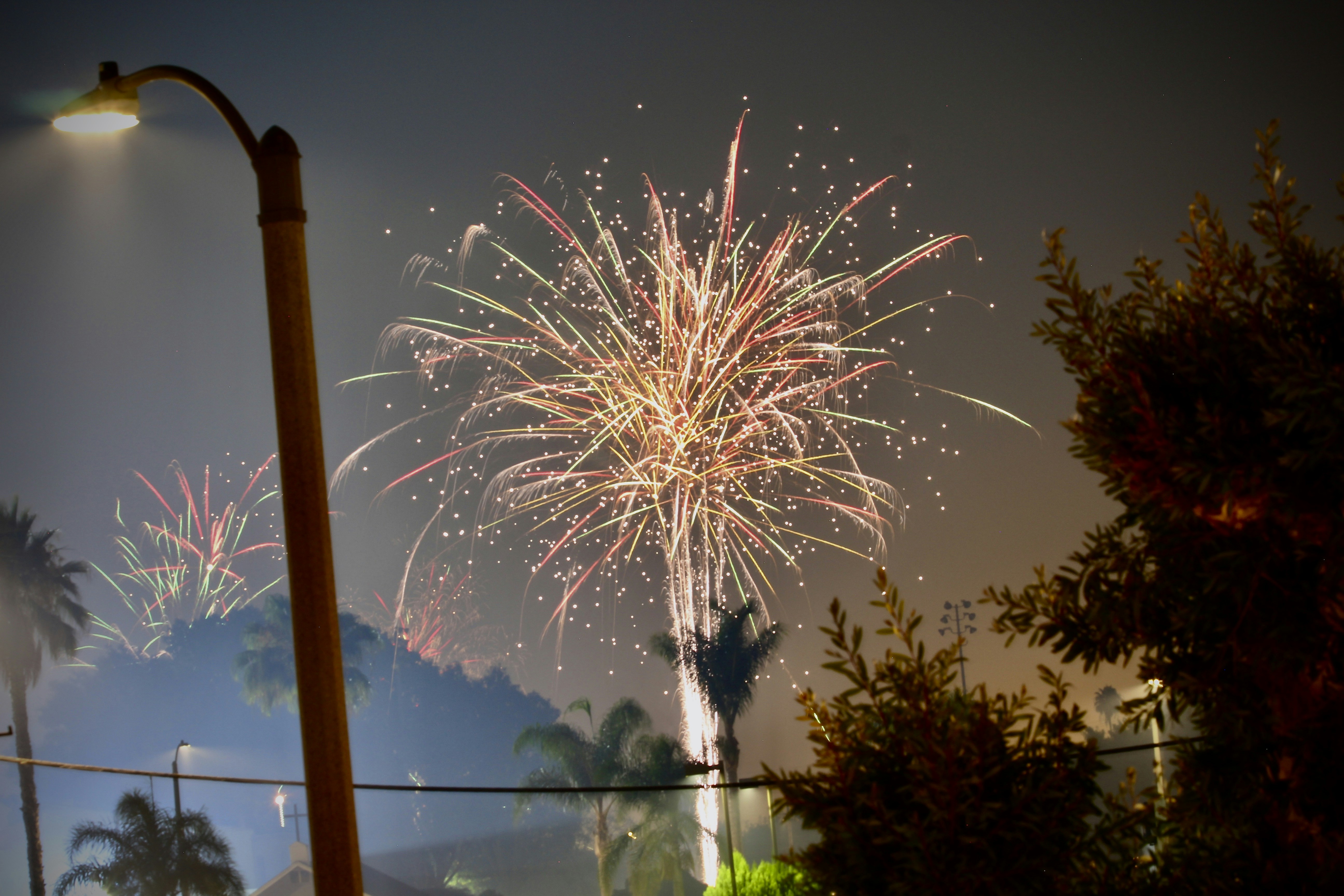 Fireworks display over body of water during night time photo – Free ...