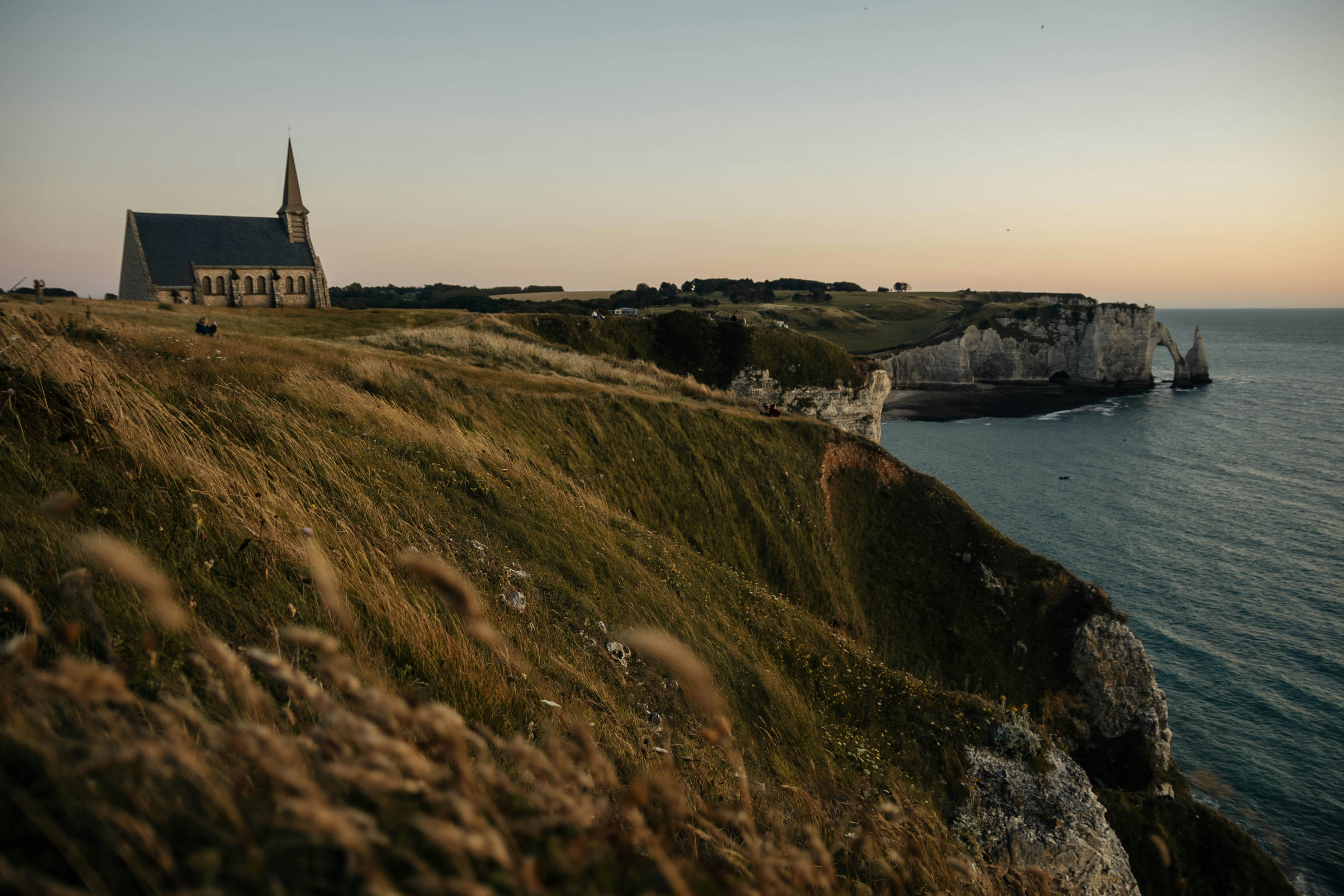 Clifftop Church and Sea Light at Dusk