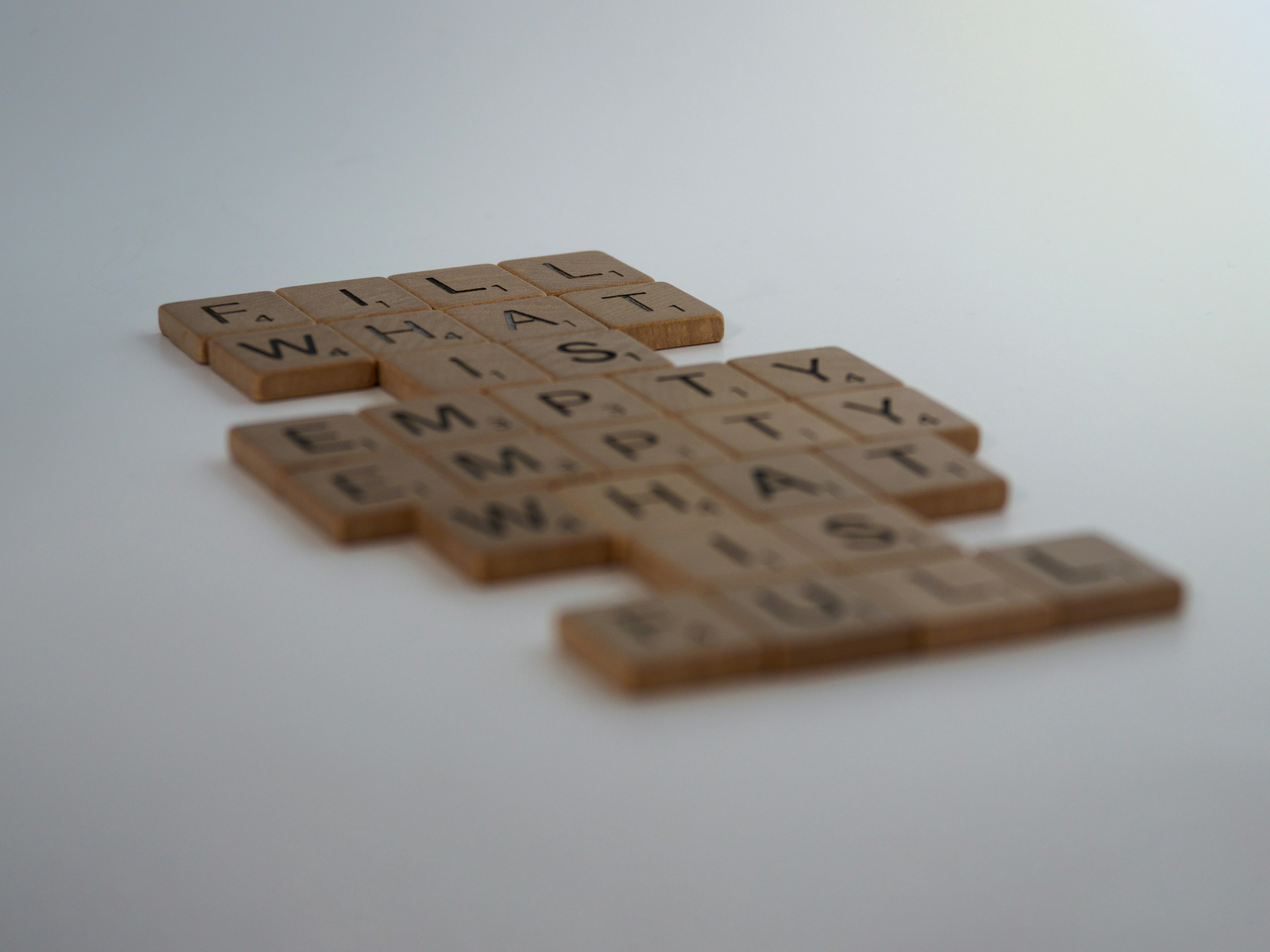 scrabble, scrabble pieces, lettering, letters, white background, wood, scrabble tiles, wood, words, 
fill what is empty, empty what is full, life, routine, chores, real life, circle of life, 
