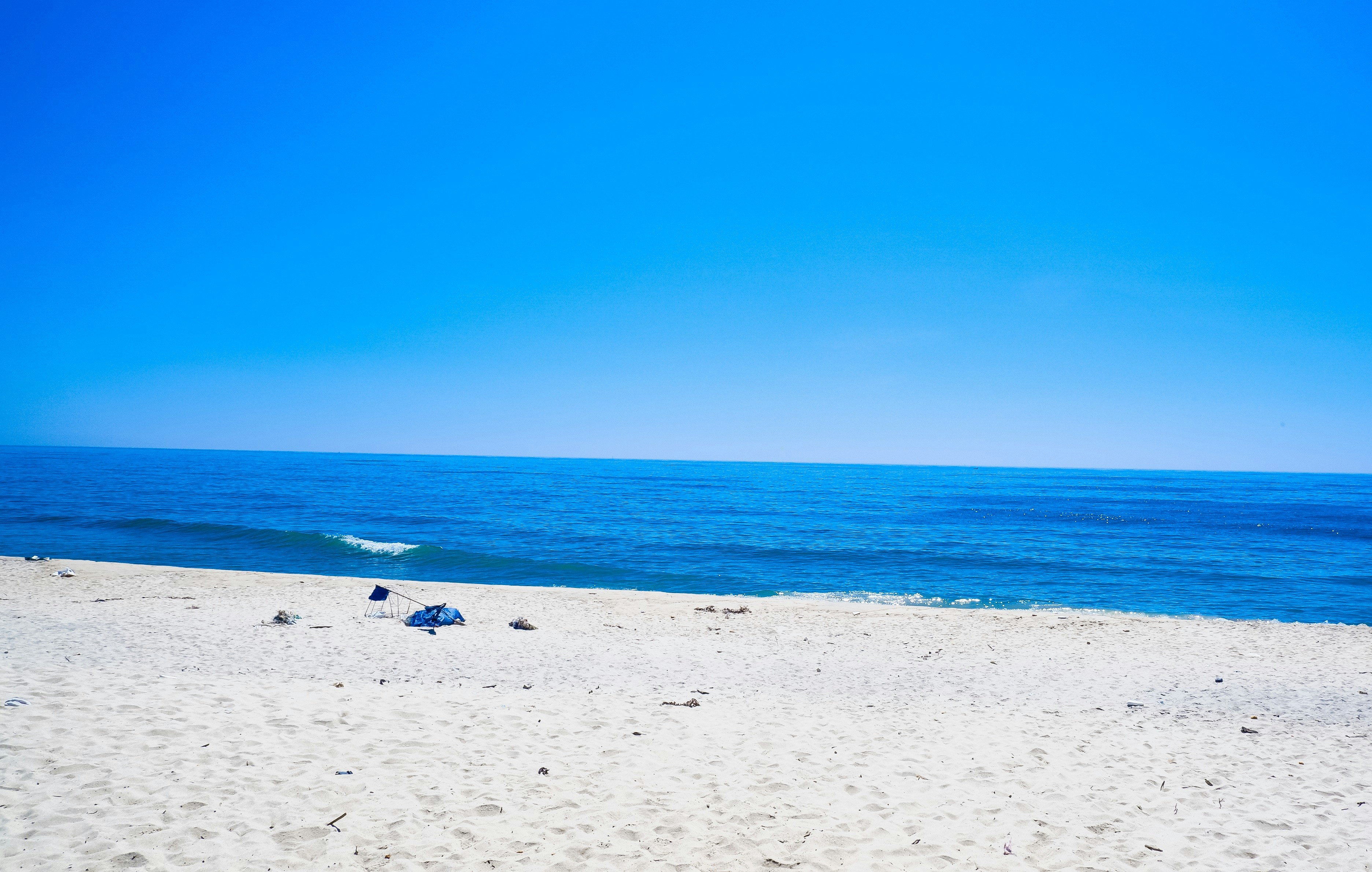 People on beach during daytime photo – Free Beach Image on Unsplash
