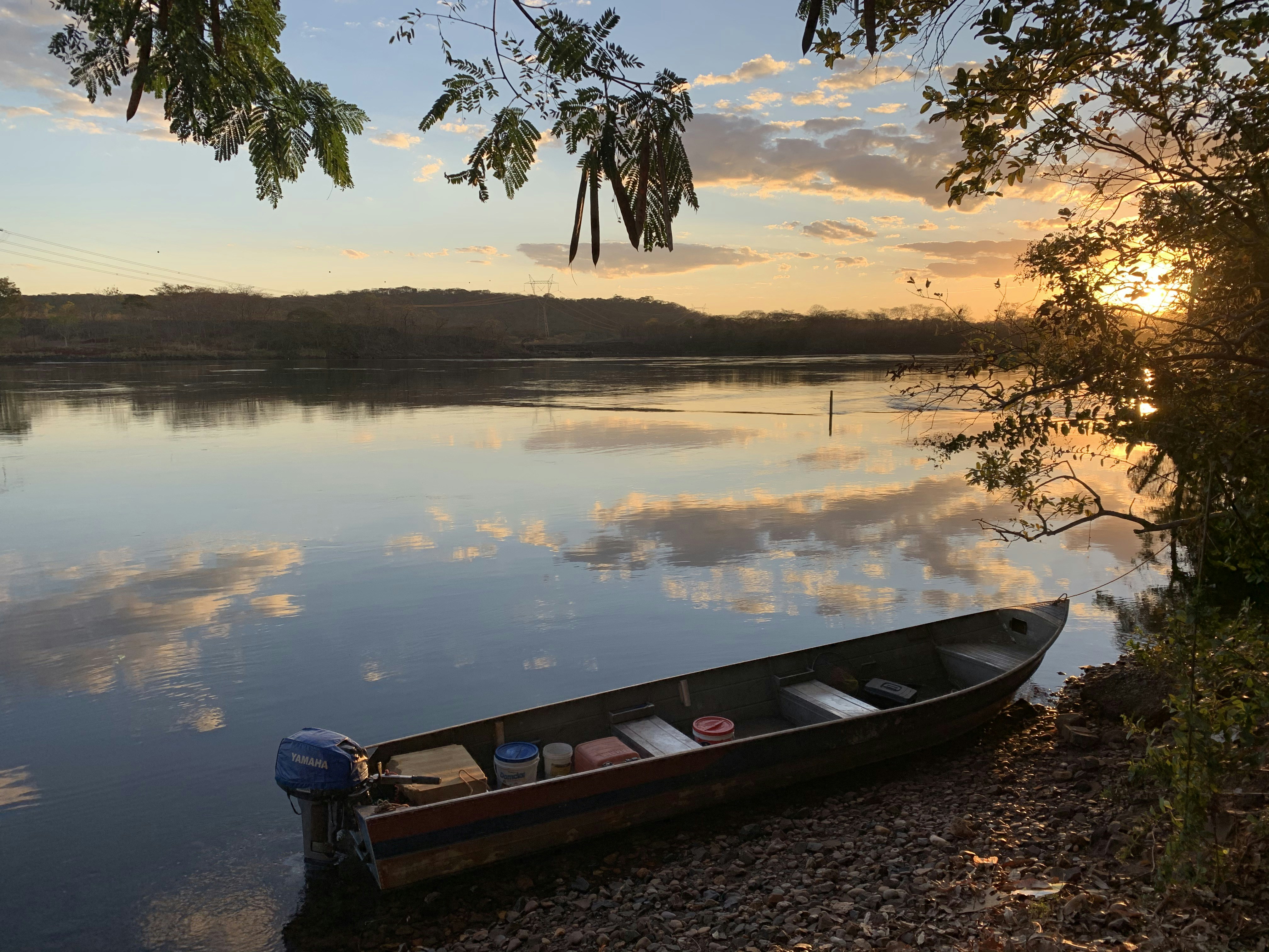 Rowboat at Sunset: Quiet Echoes on a Pebble Shore