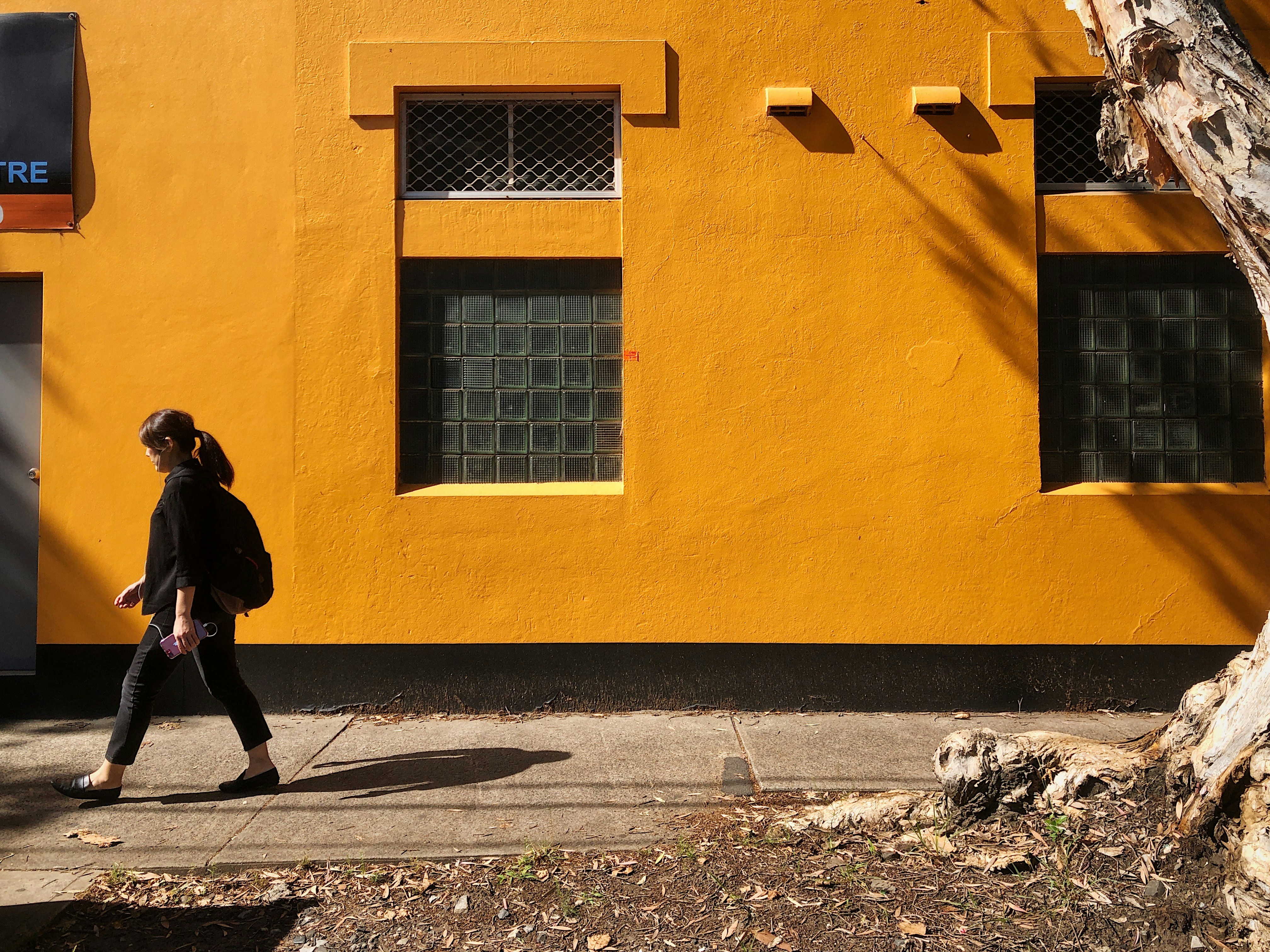 Urban Stroll Against a Vibrant Canvas