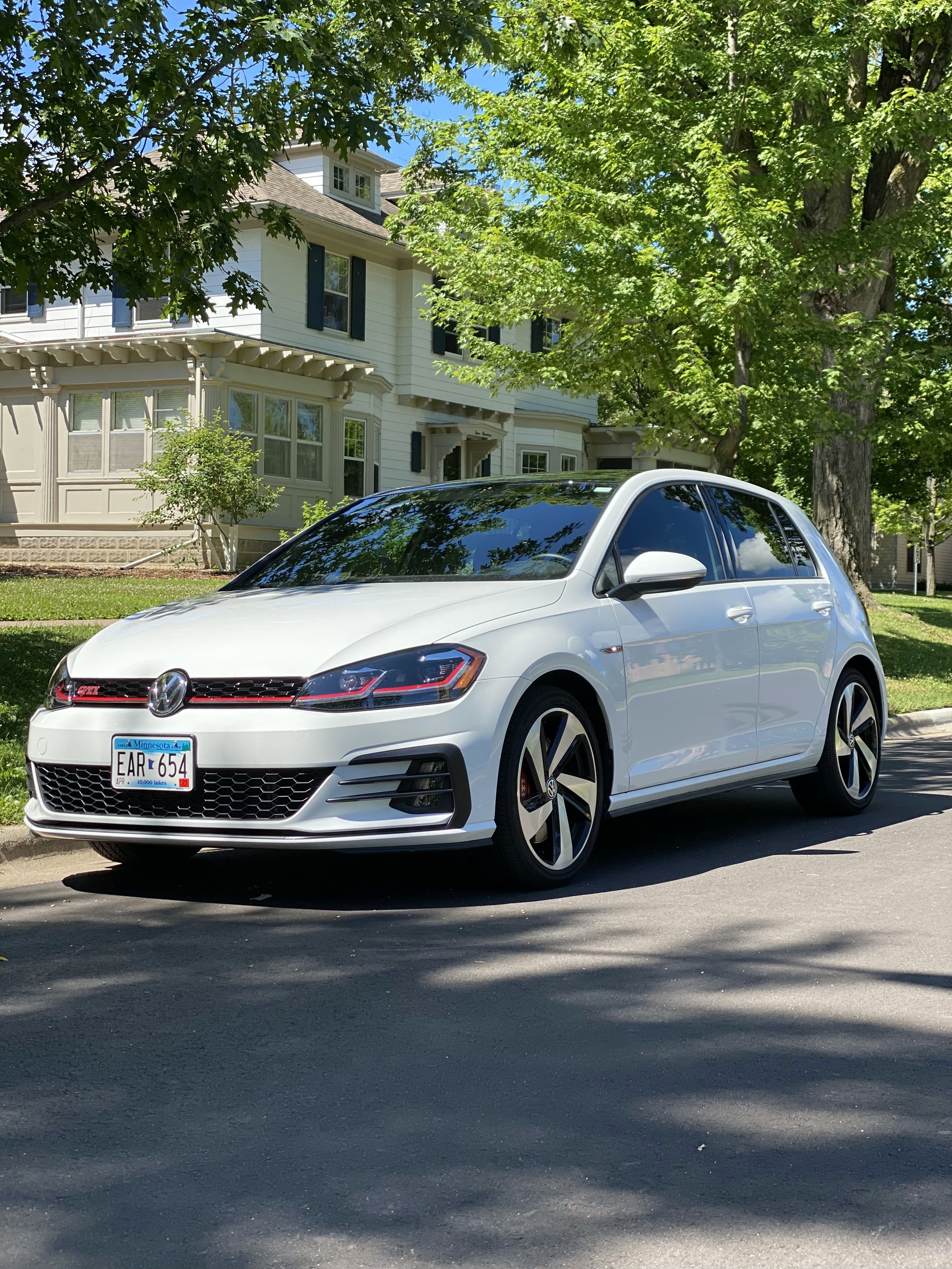 Urban Elegance: Compact Car in Suburban Serenity