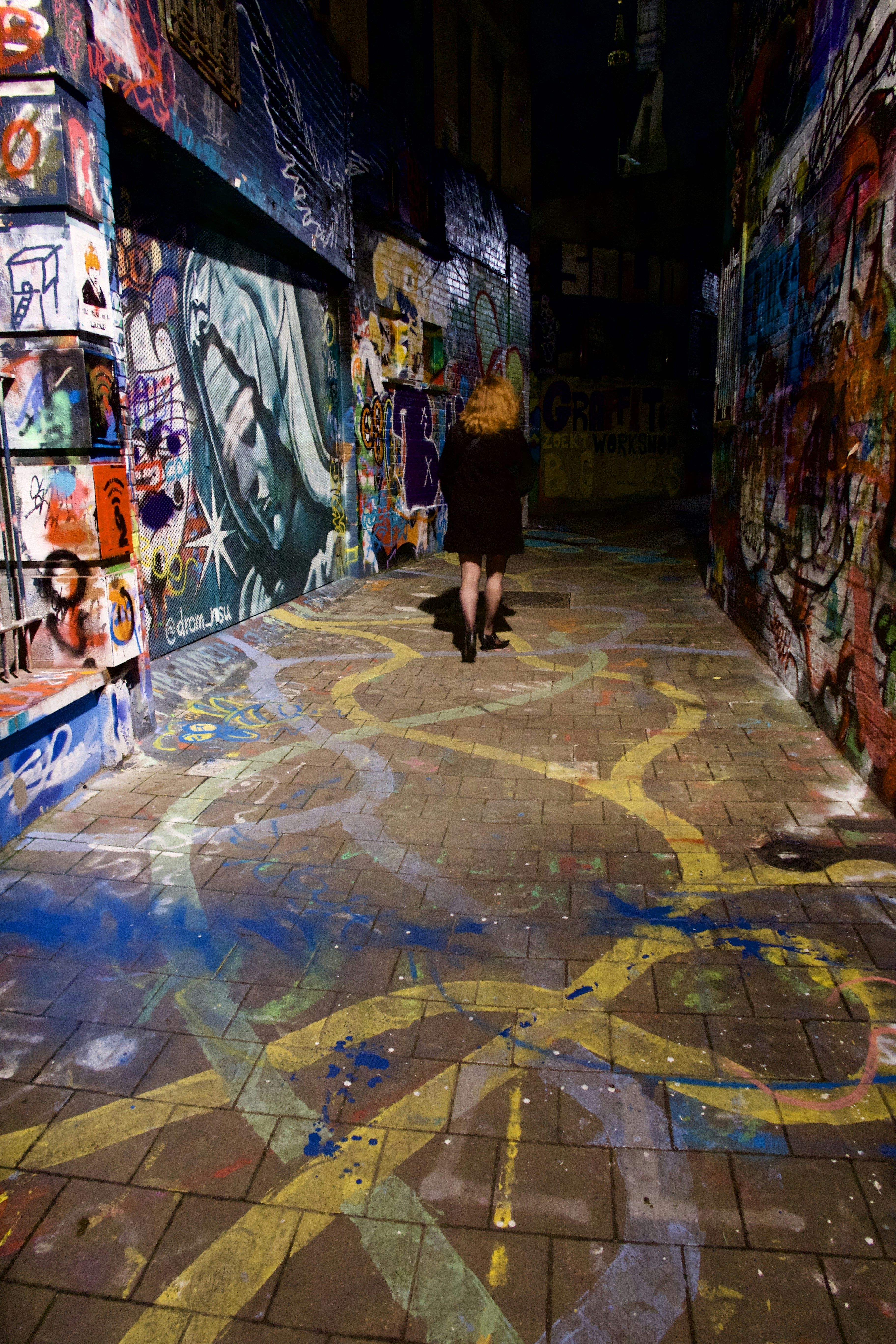 Midnight Alley: A Figure Walks Through Painted Rain