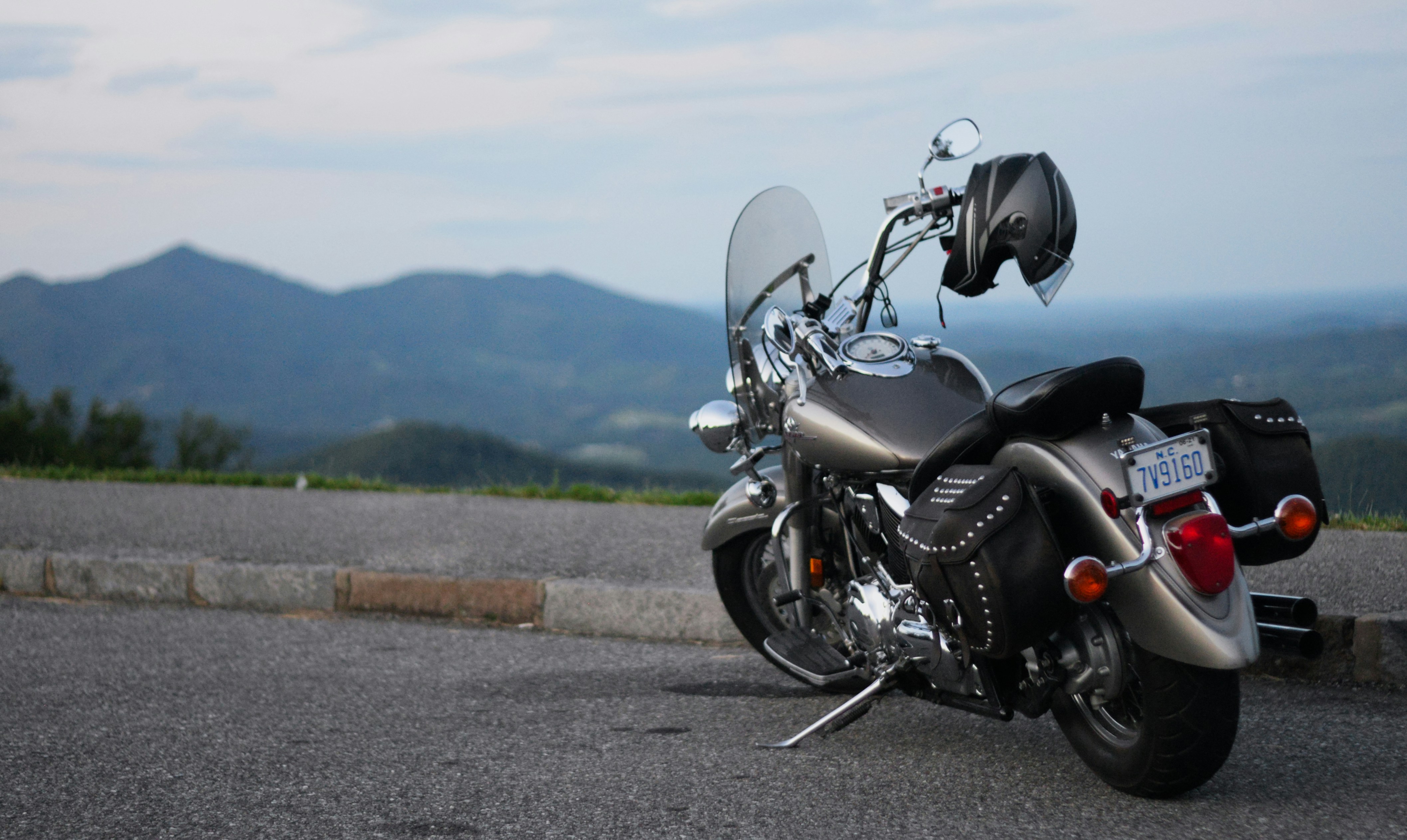 Black and silver cruiser motorcycle on road during daytime photo – Free ...