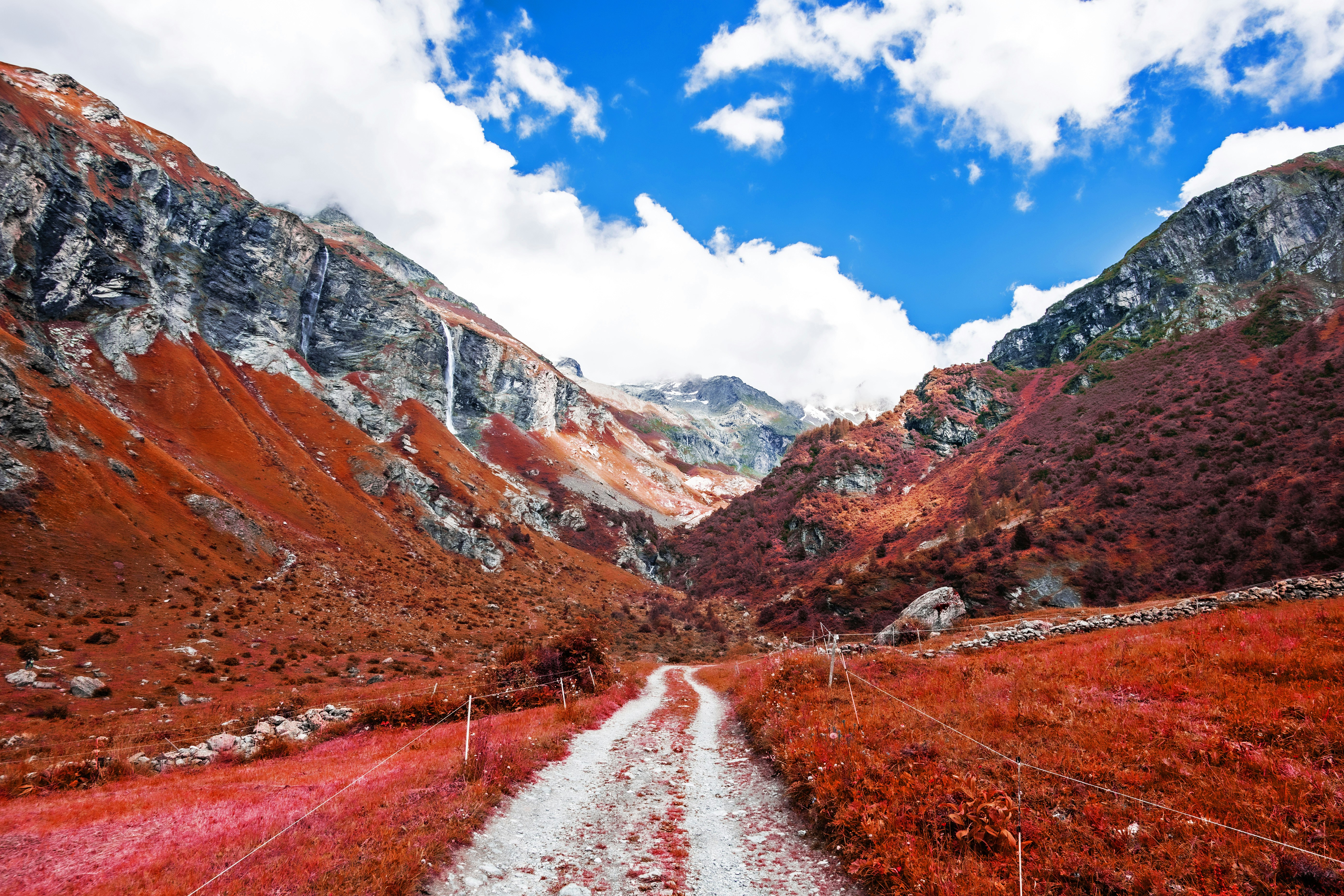Autumn Pathway Through Alpine Valleys