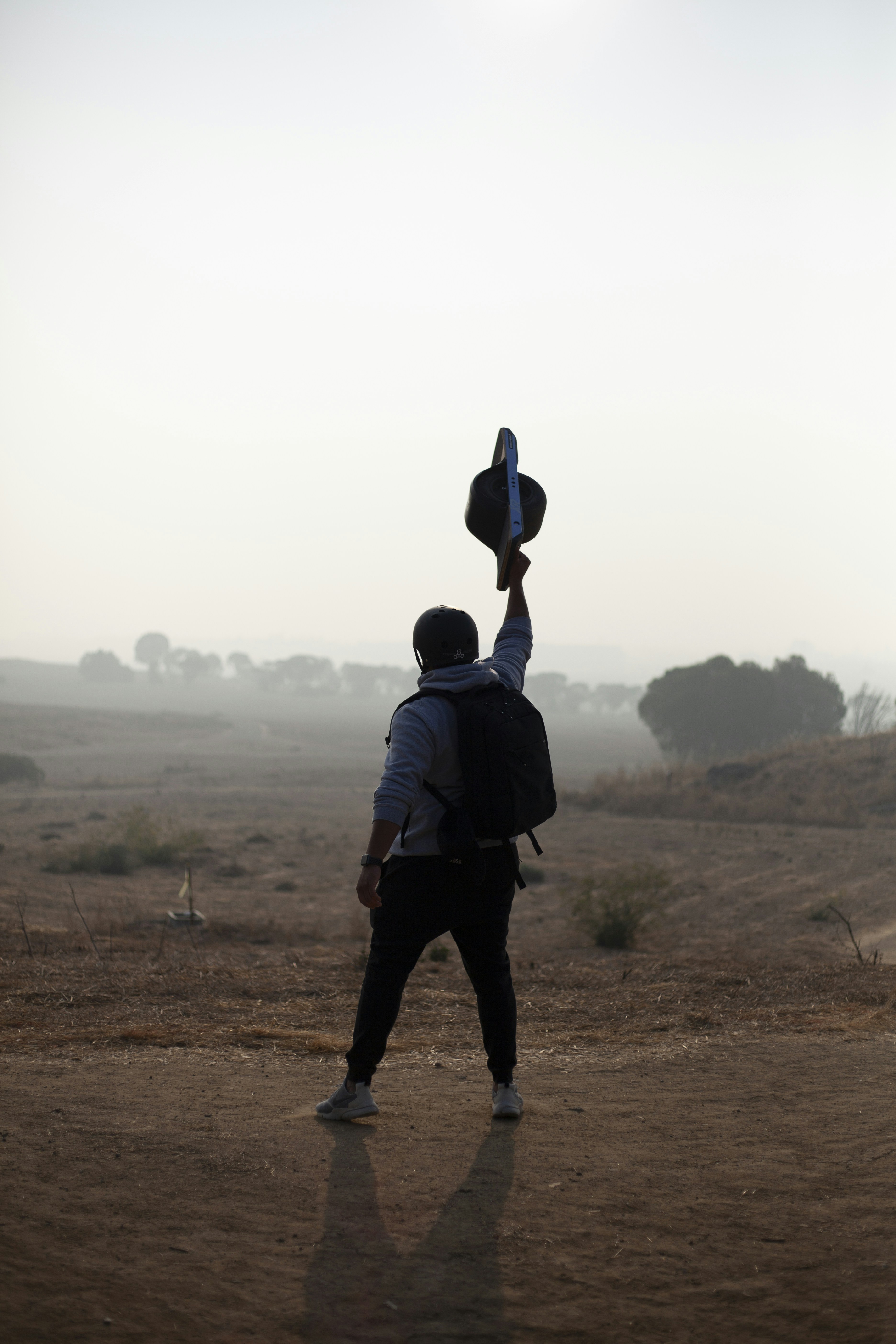 A Onewheel rider preparing for a foggy day hike. Taken during the California wildfires of 2019.