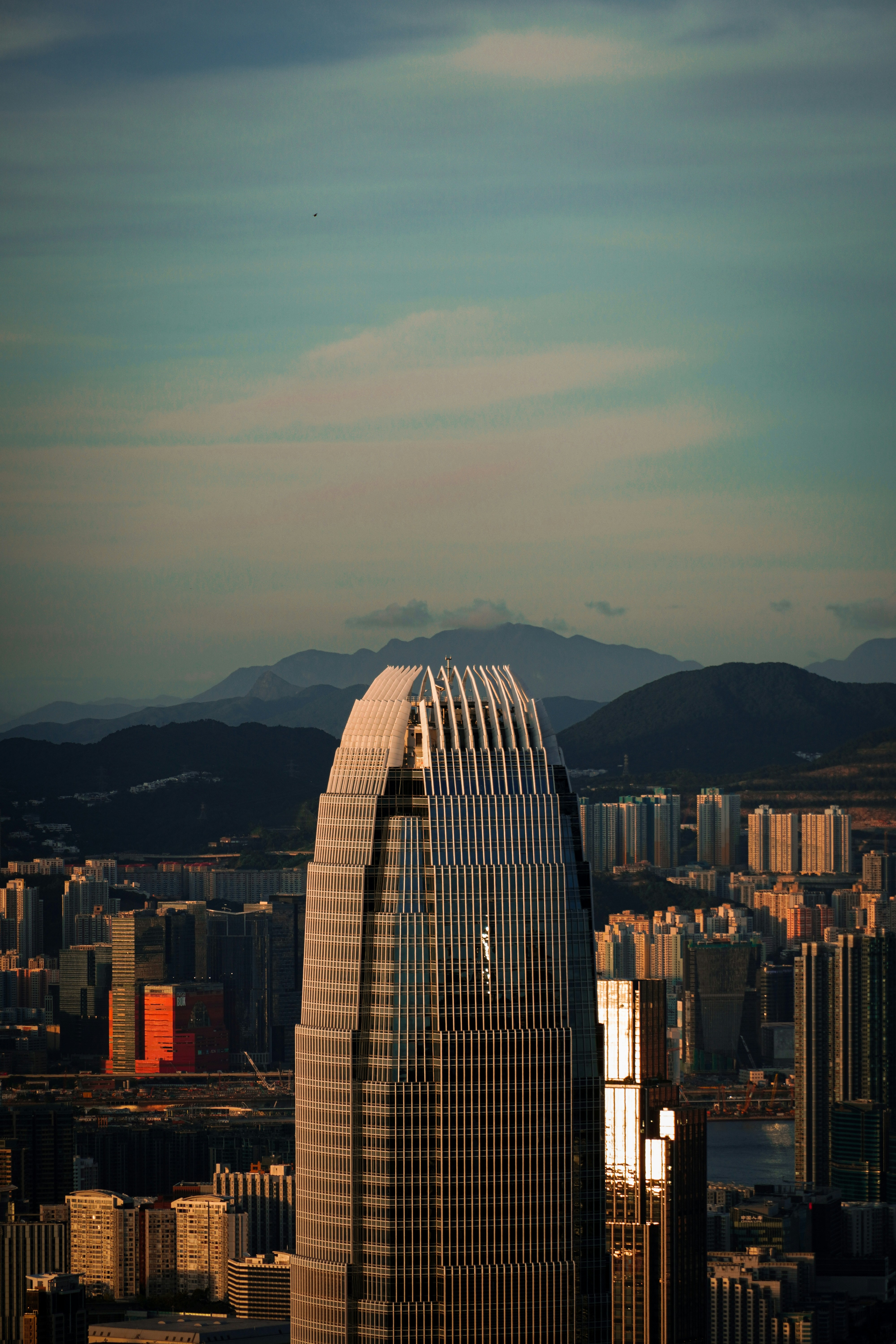 High rise buildings near mountain during daytime photo – Free Grey ...
