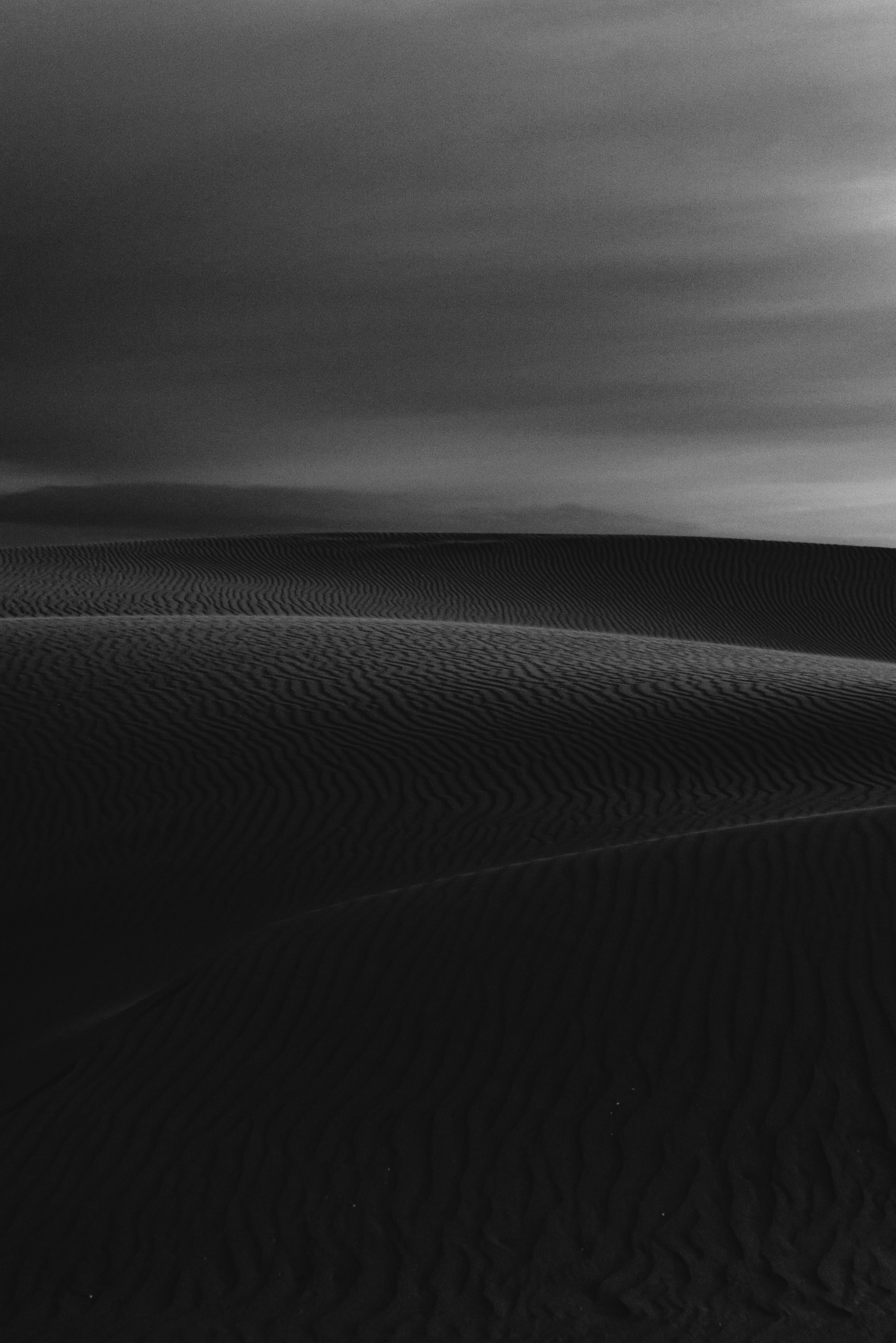 Grayscale photo of desert under cloudy sky photo – Free Grey Image on ...