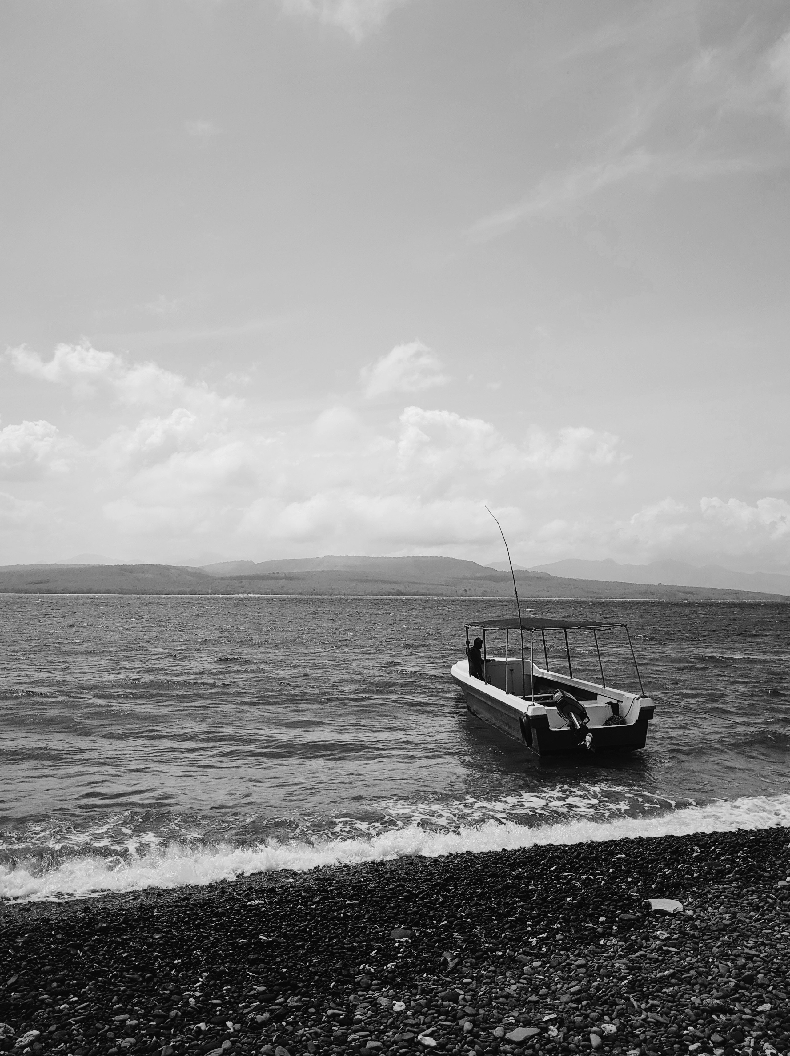 Grayscale photo of boat on sea photo – Free Travel Image on Unsplash