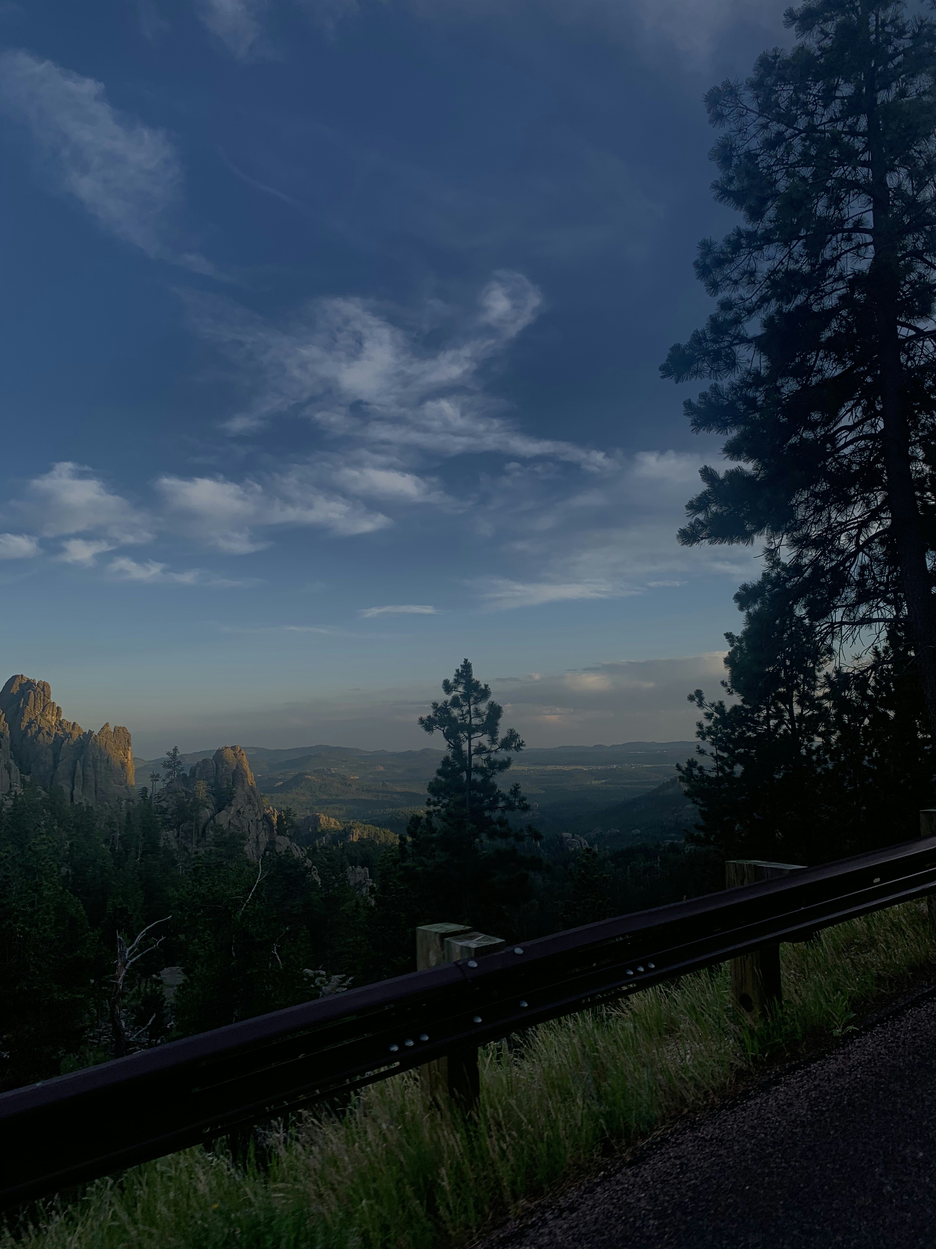 Green trees near brown mountain under blue sky during daytime photo ...
