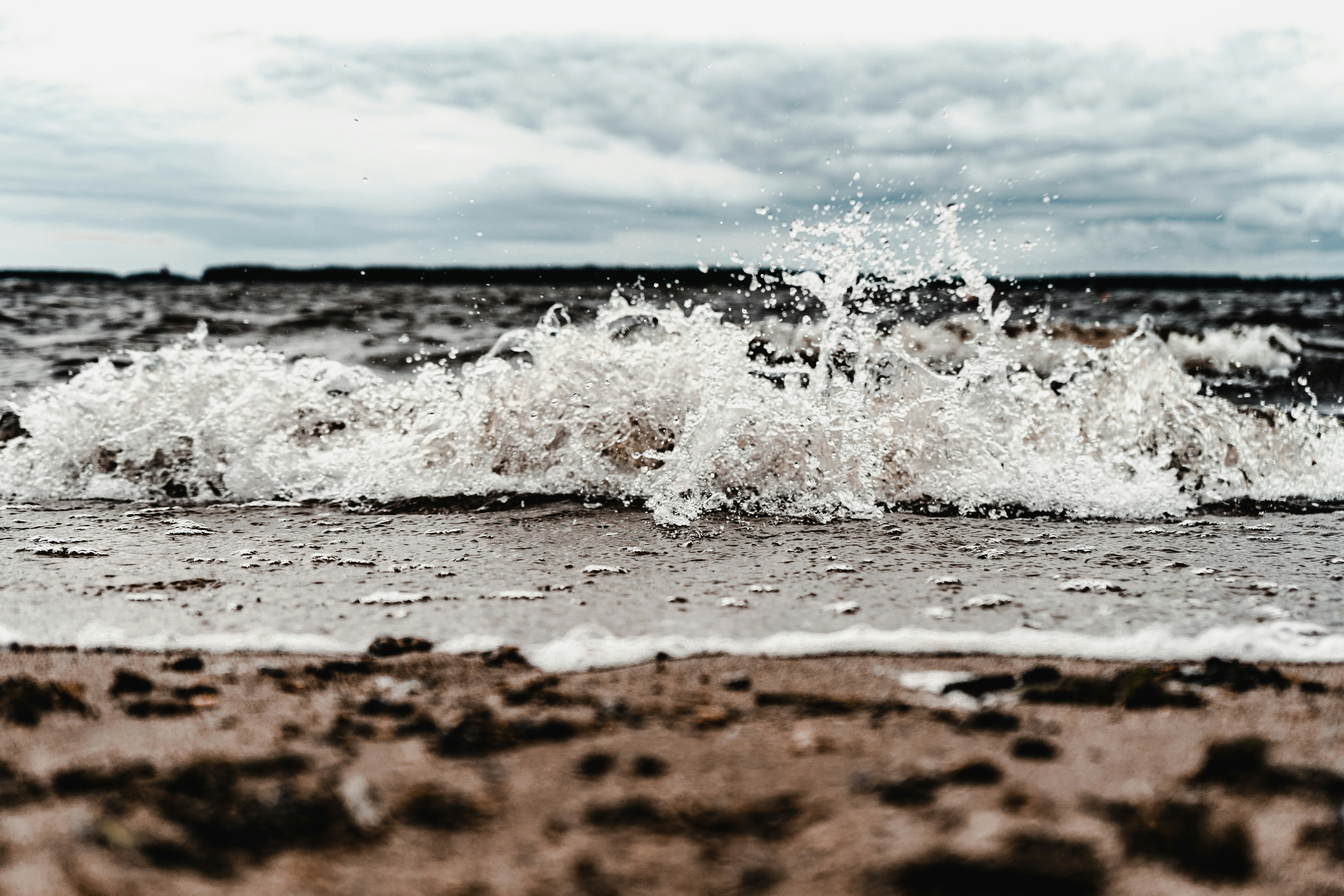 ocean waves on brown sand during daytimeMary Ray