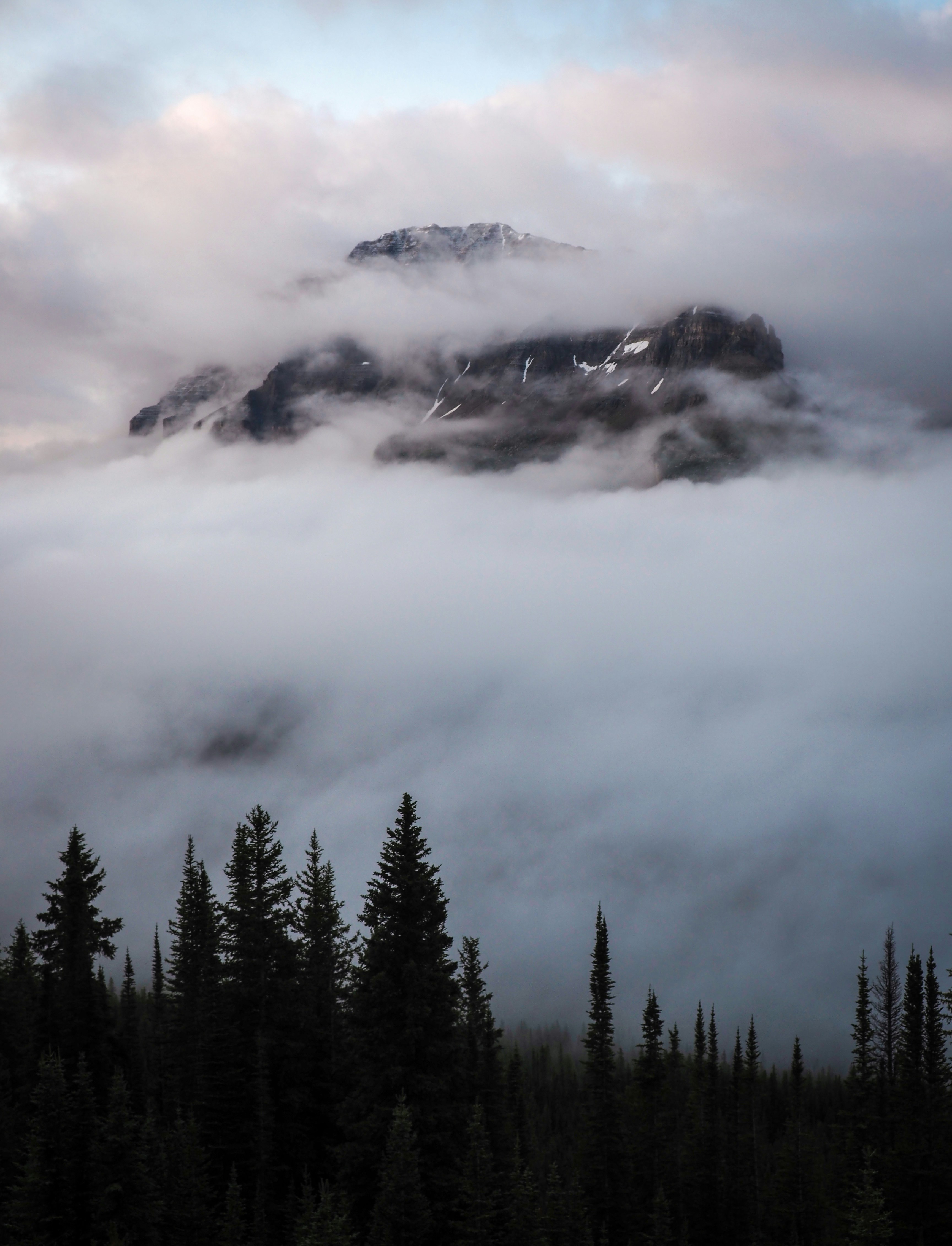 Remnant clouds from the previous night's storm in Banff, Alberta, Canada. 