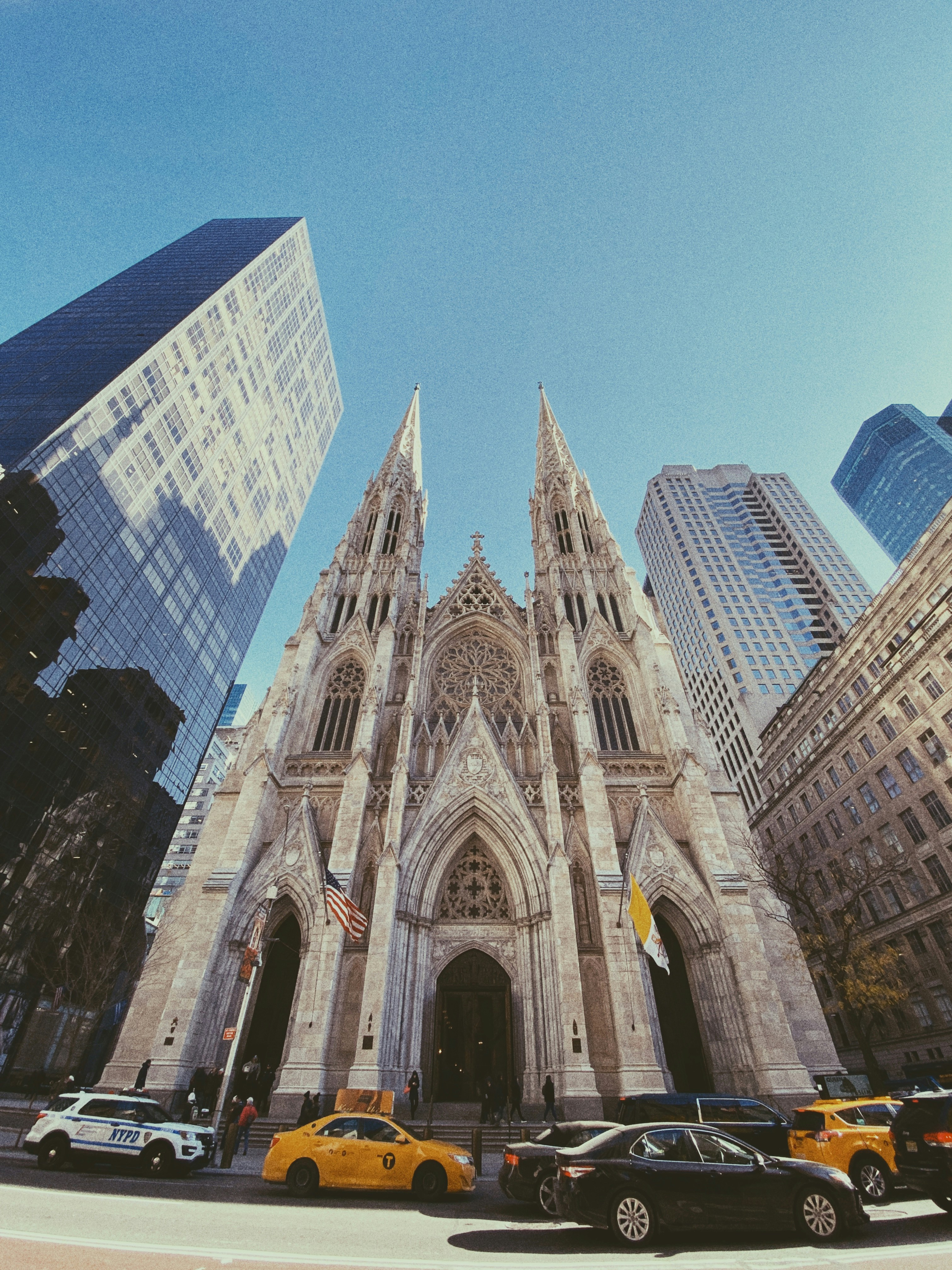 Gothic Facade Rising Over a Busy City Street