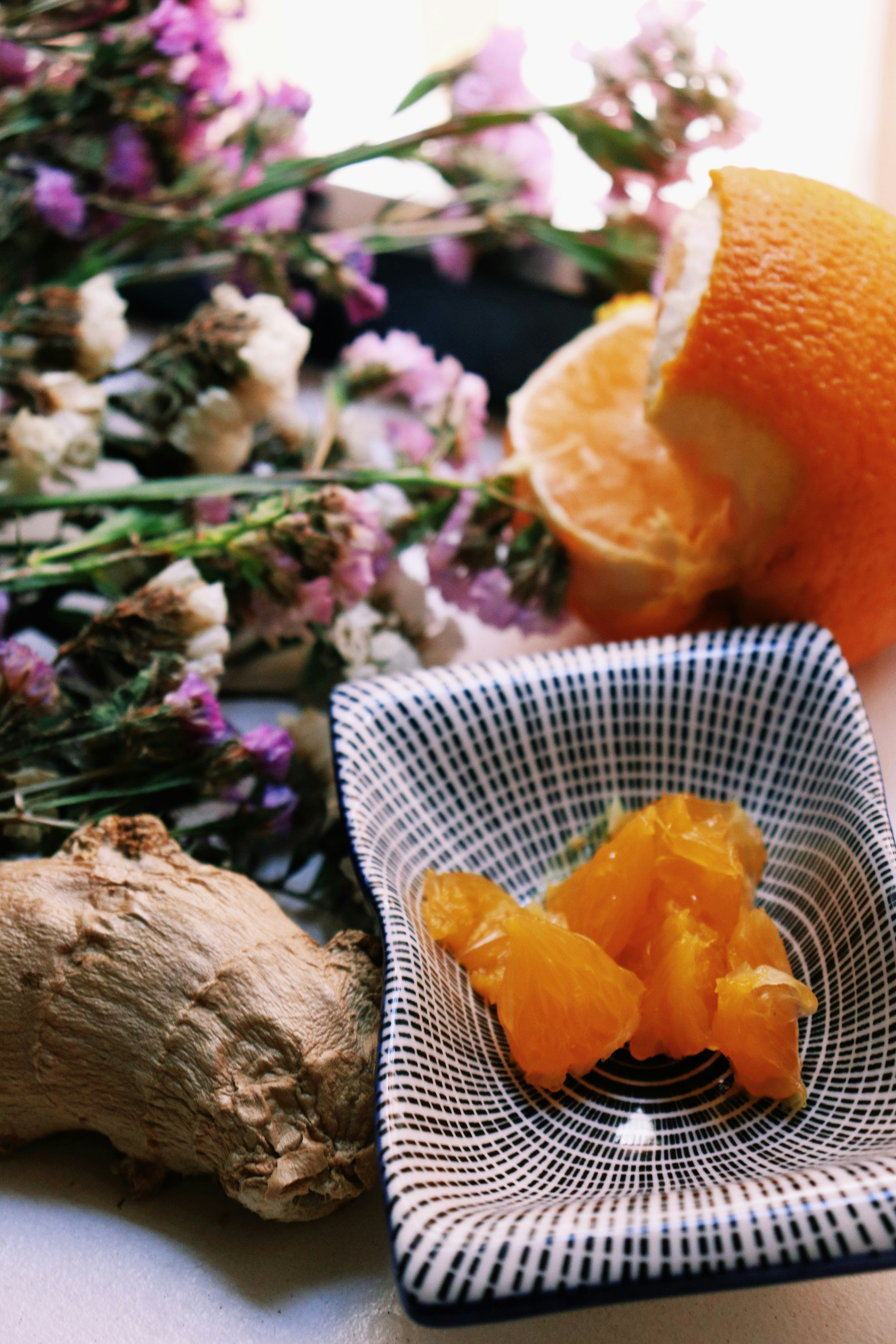 Citrus Fragments and Wildflowers: A Quiet Still Life