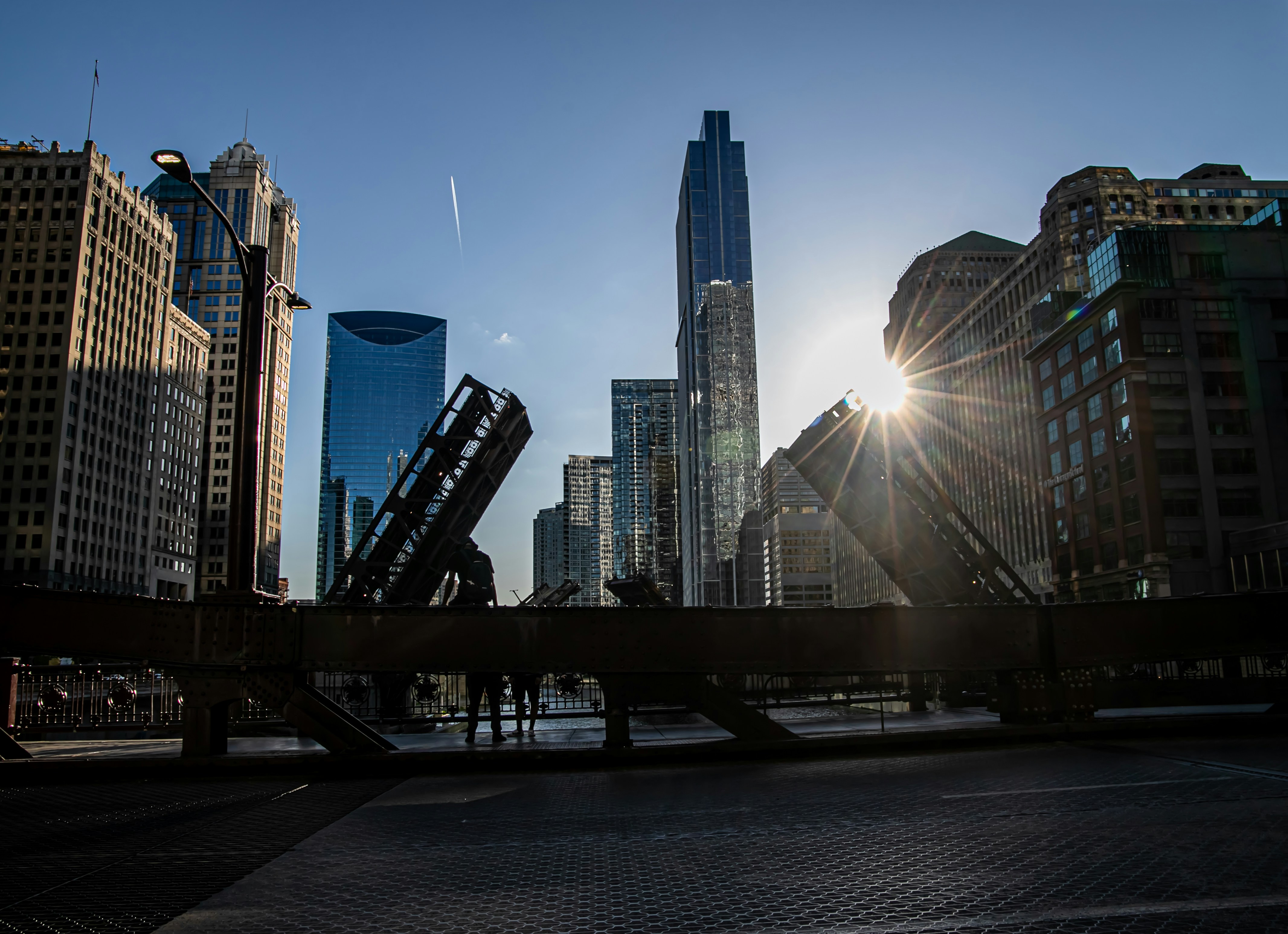 Sunburst Through Steel: Framing a Modern Skyline