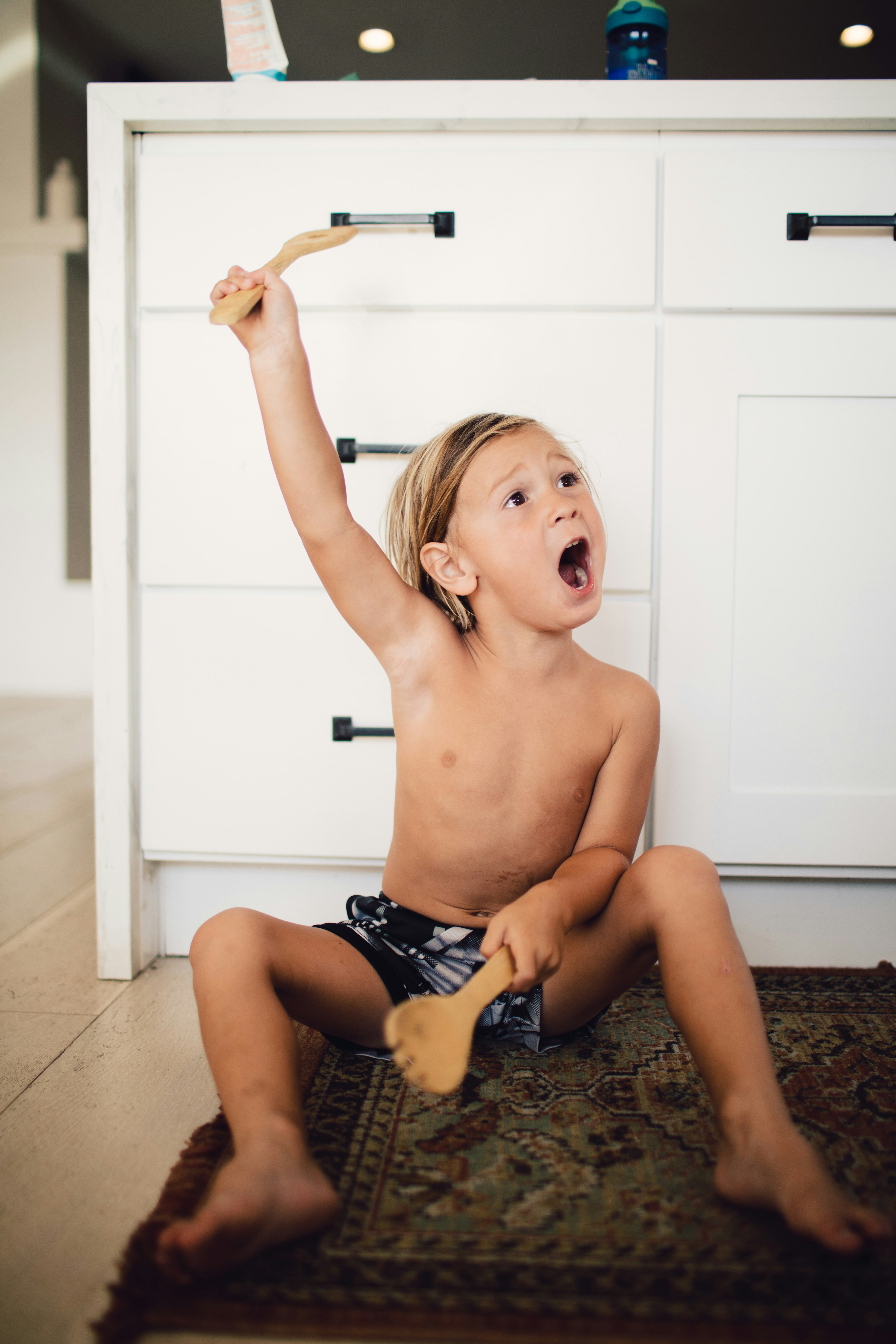 Tiny Hand, Big Expression: A Kitchen Symphony of Playful Drama