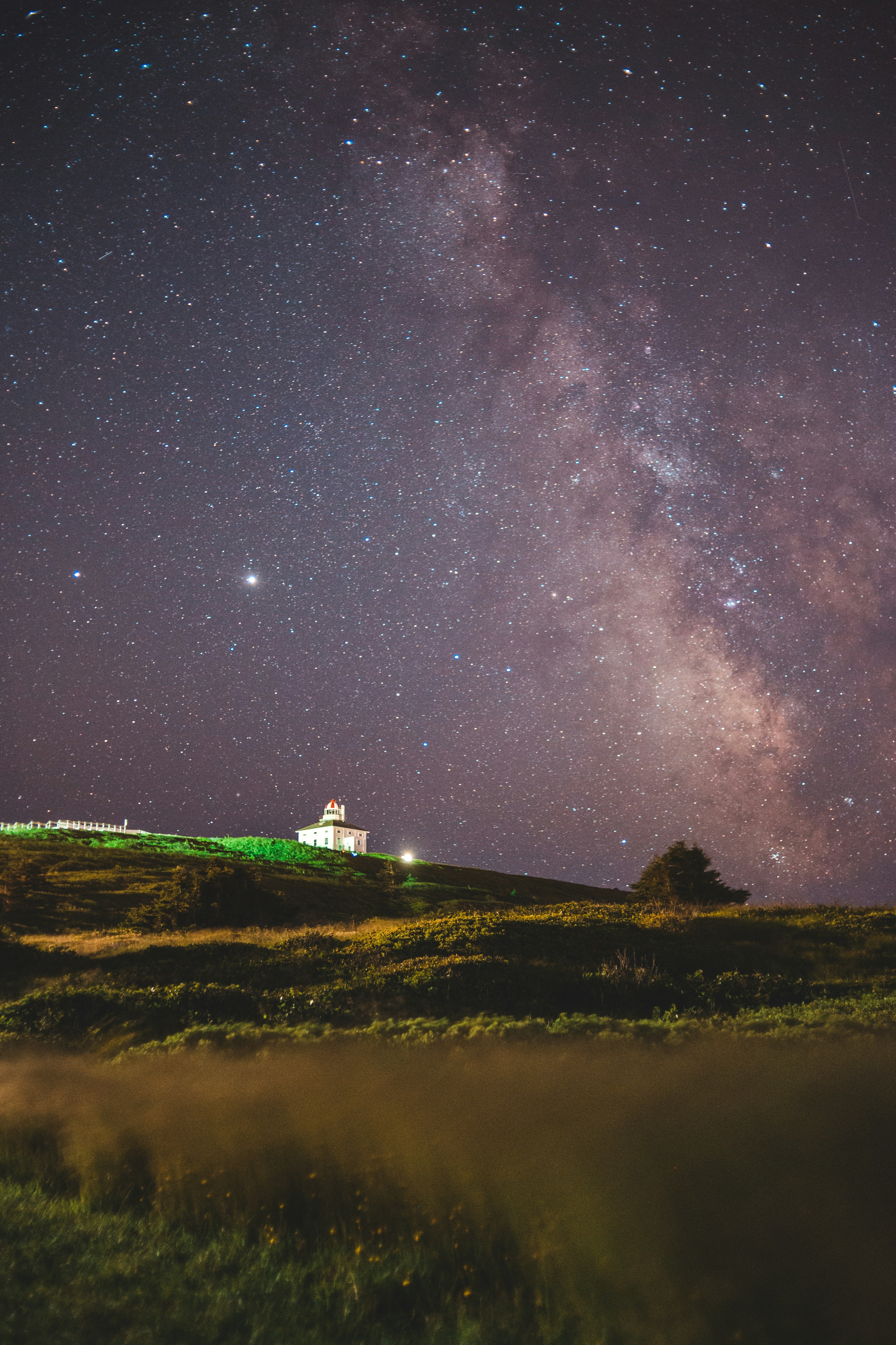 Milky Way Arc over a Hilltop White House at Velvet Night