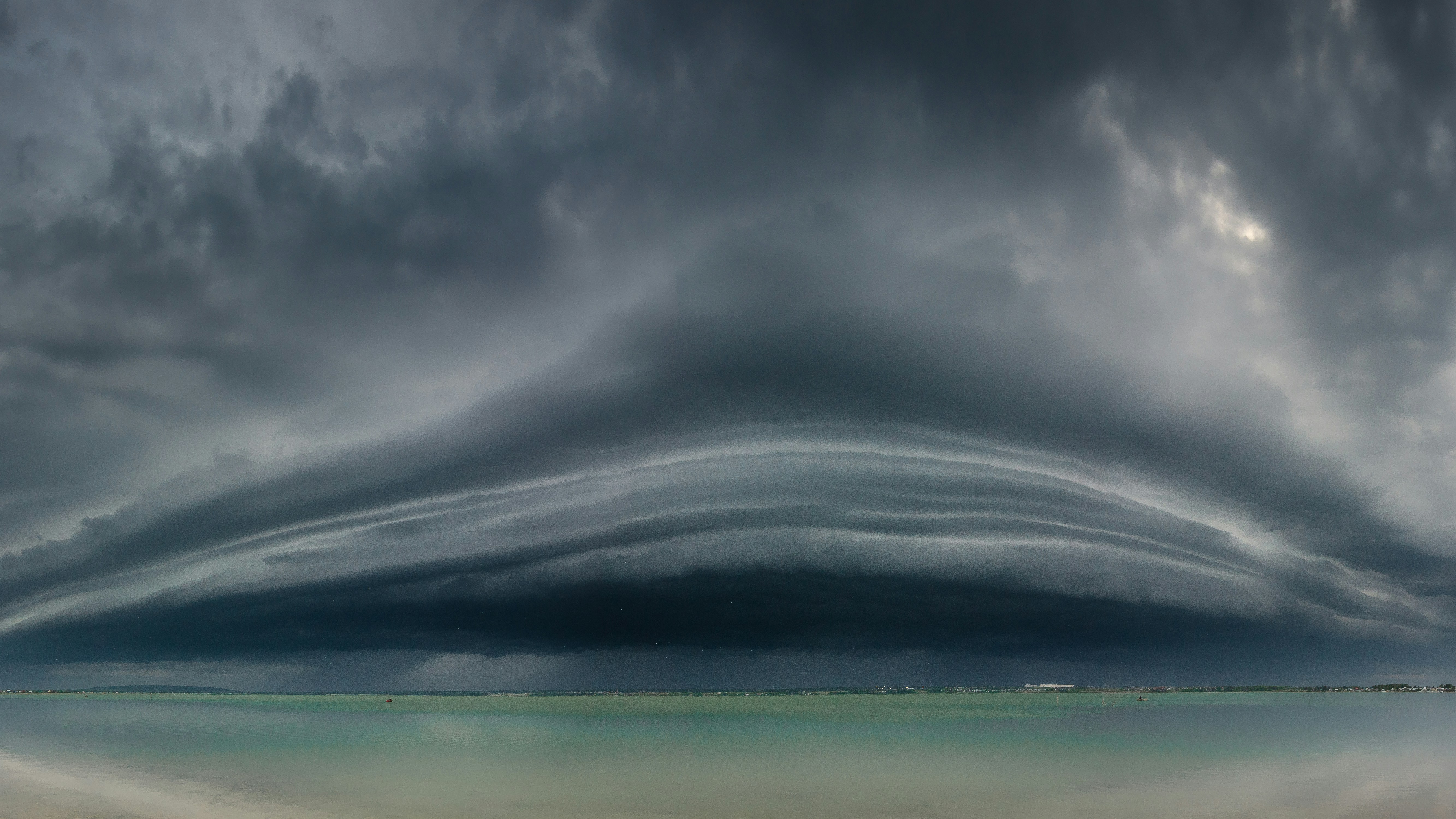 Gray clouds over the sea photo – Free Синеглазово Image on Unsplash
