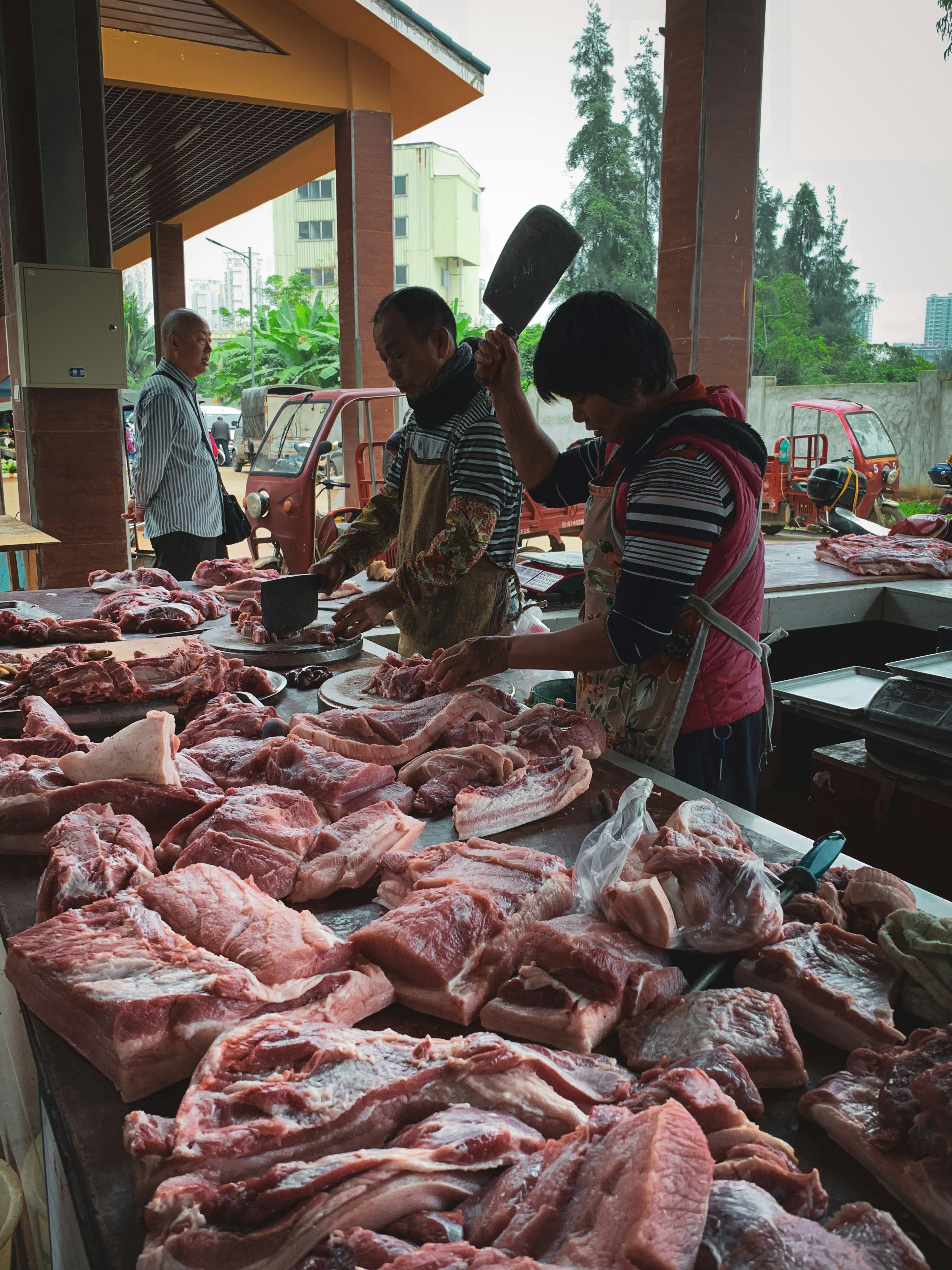 Carving Day at a Bustling Open-Air Meat Market