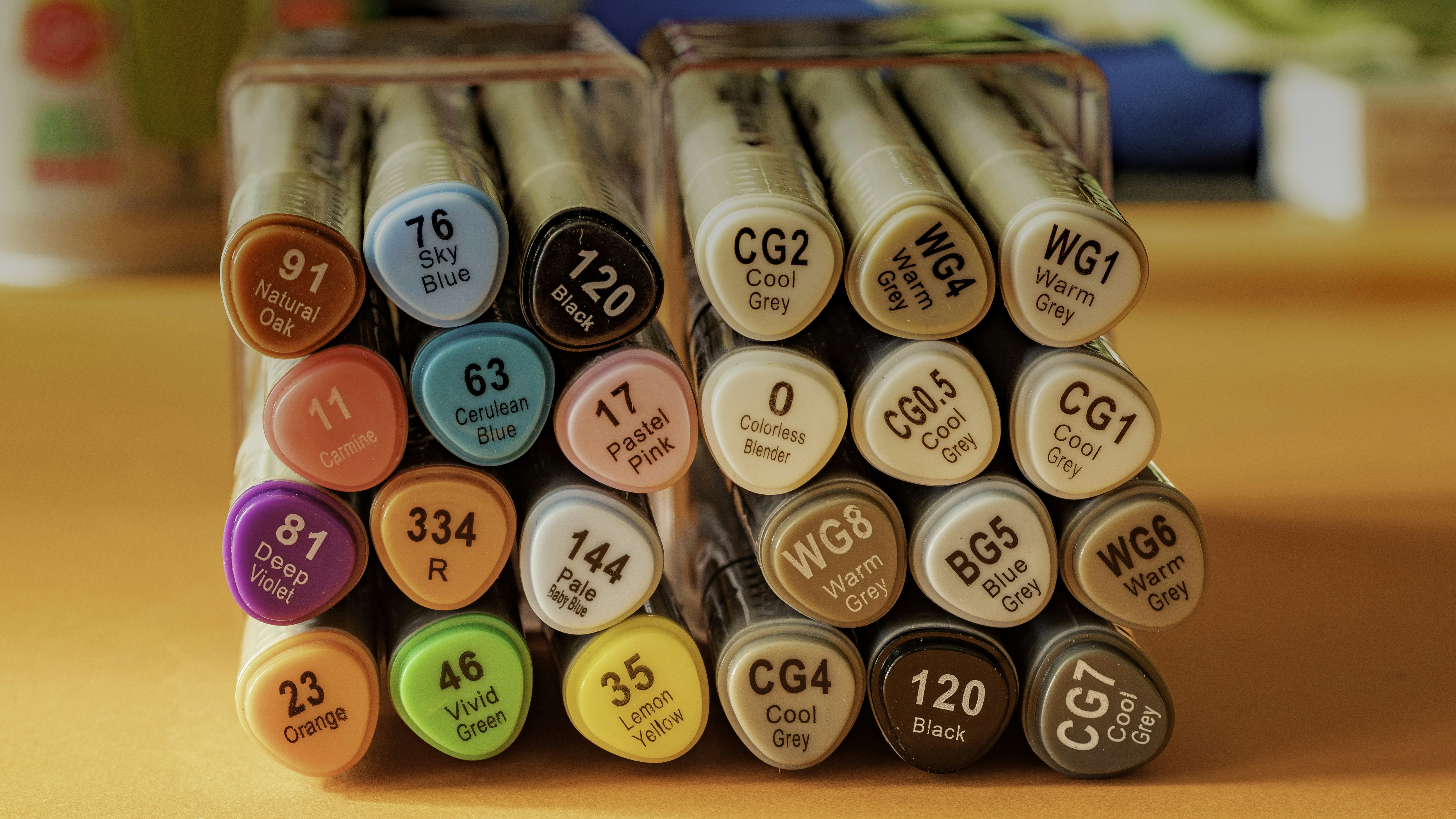Colorful assortment of art markers arranged neatly, showcasing a variety of shades and hues for creative projects.