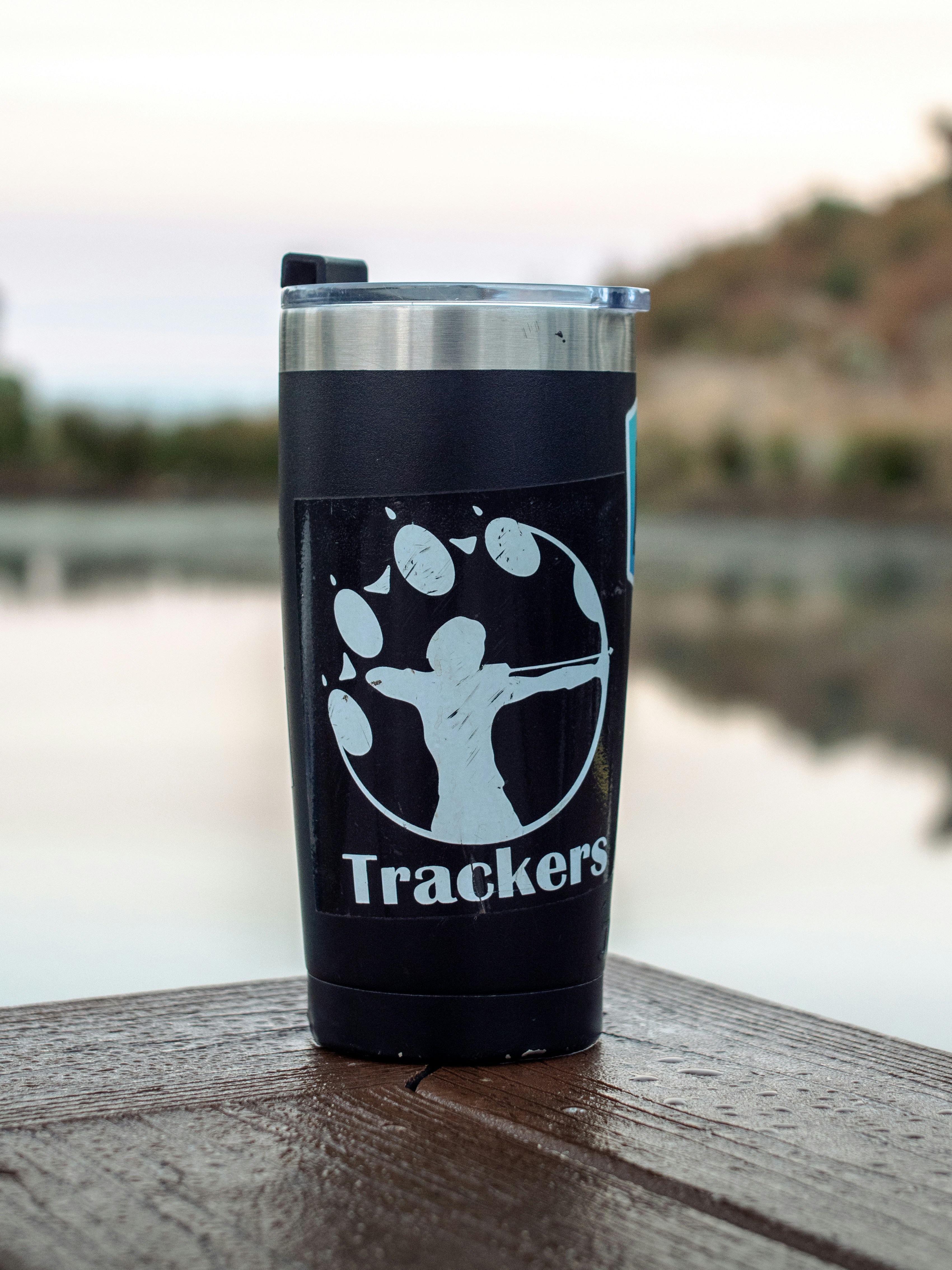 Tracker Tumbler on a Weathered Dock at Dusk