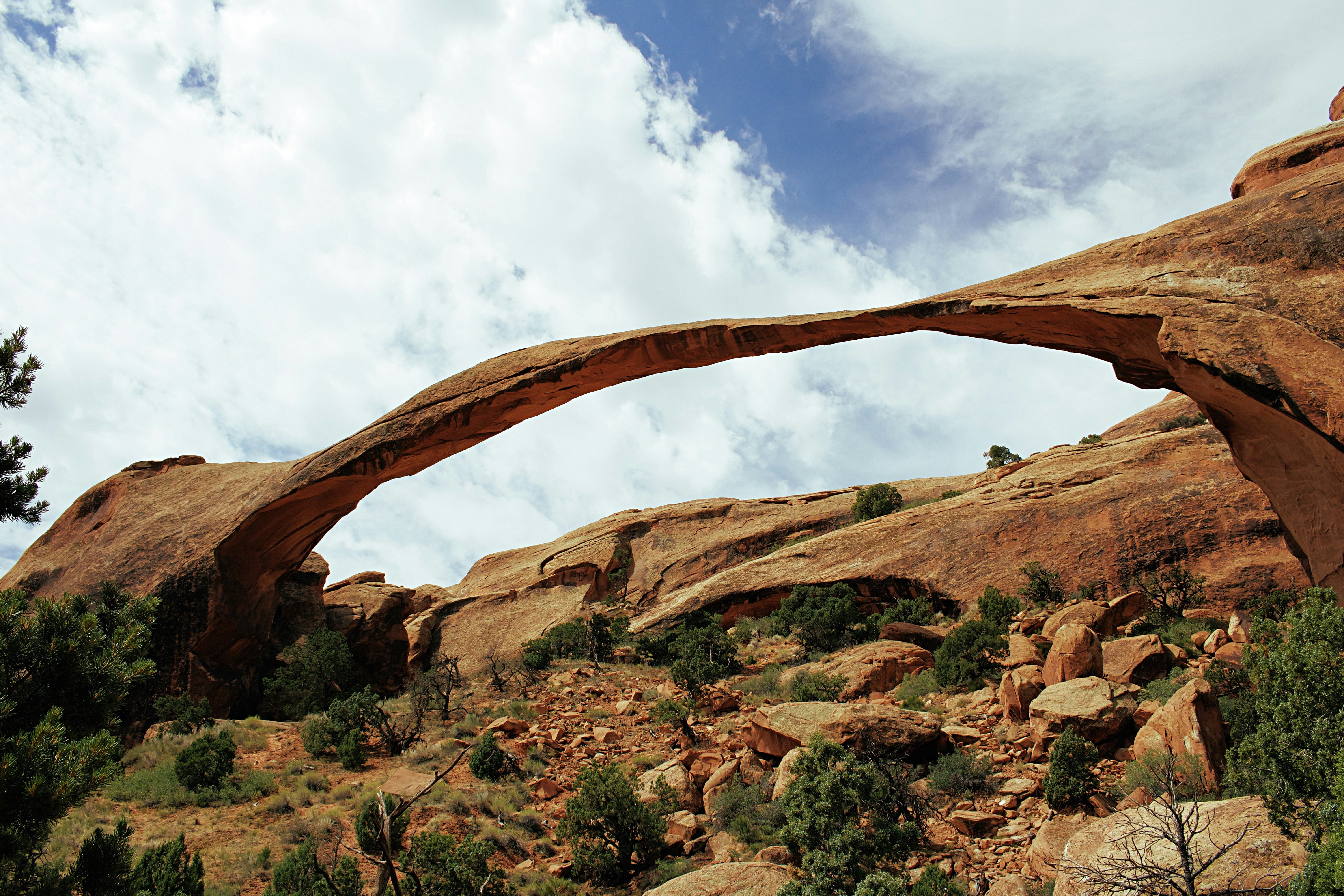 Crimson Arch Framing a Desert Sky