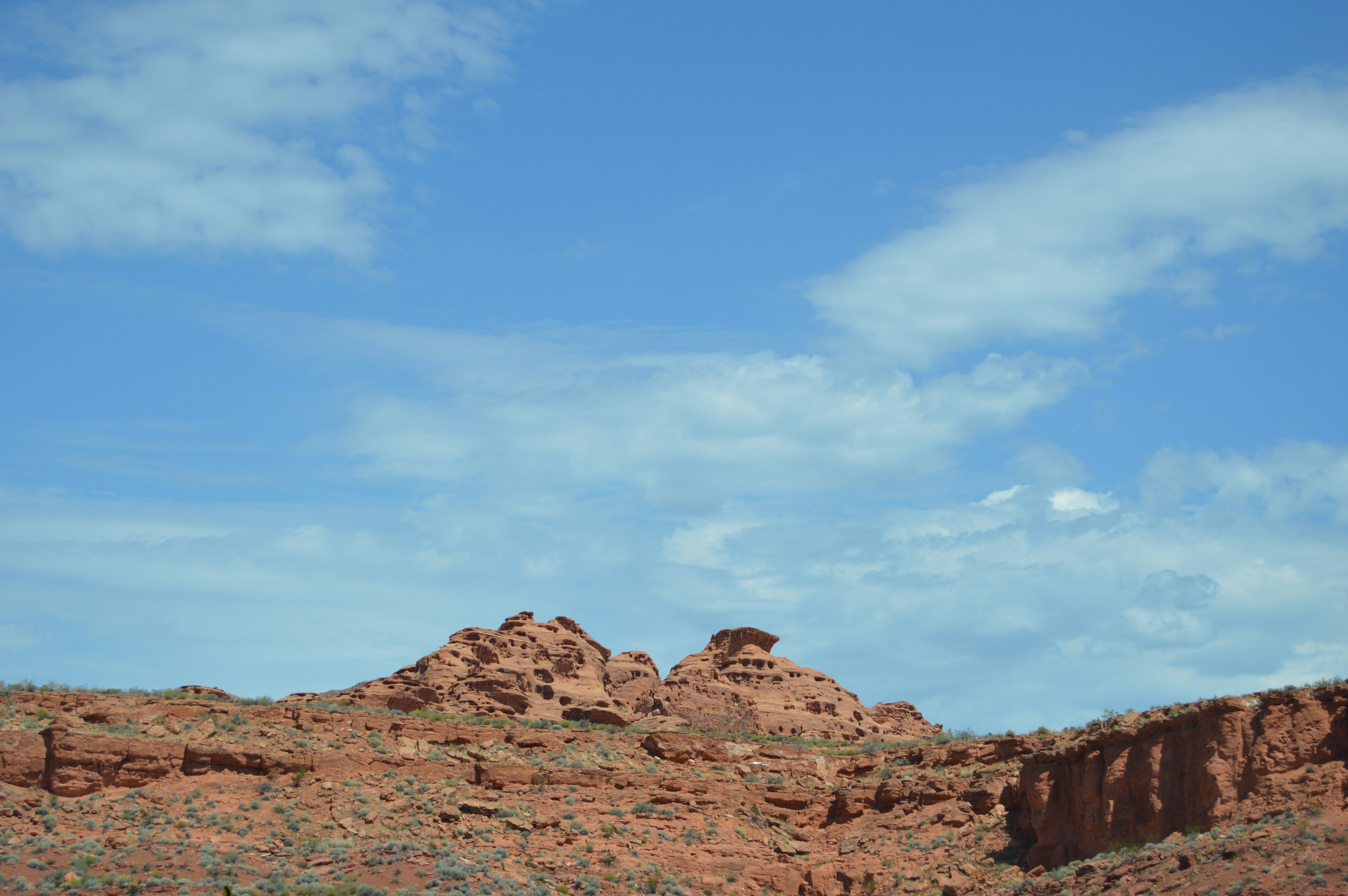 Brown rocky mountain under blue sky during daytime photo – Free Blue ...