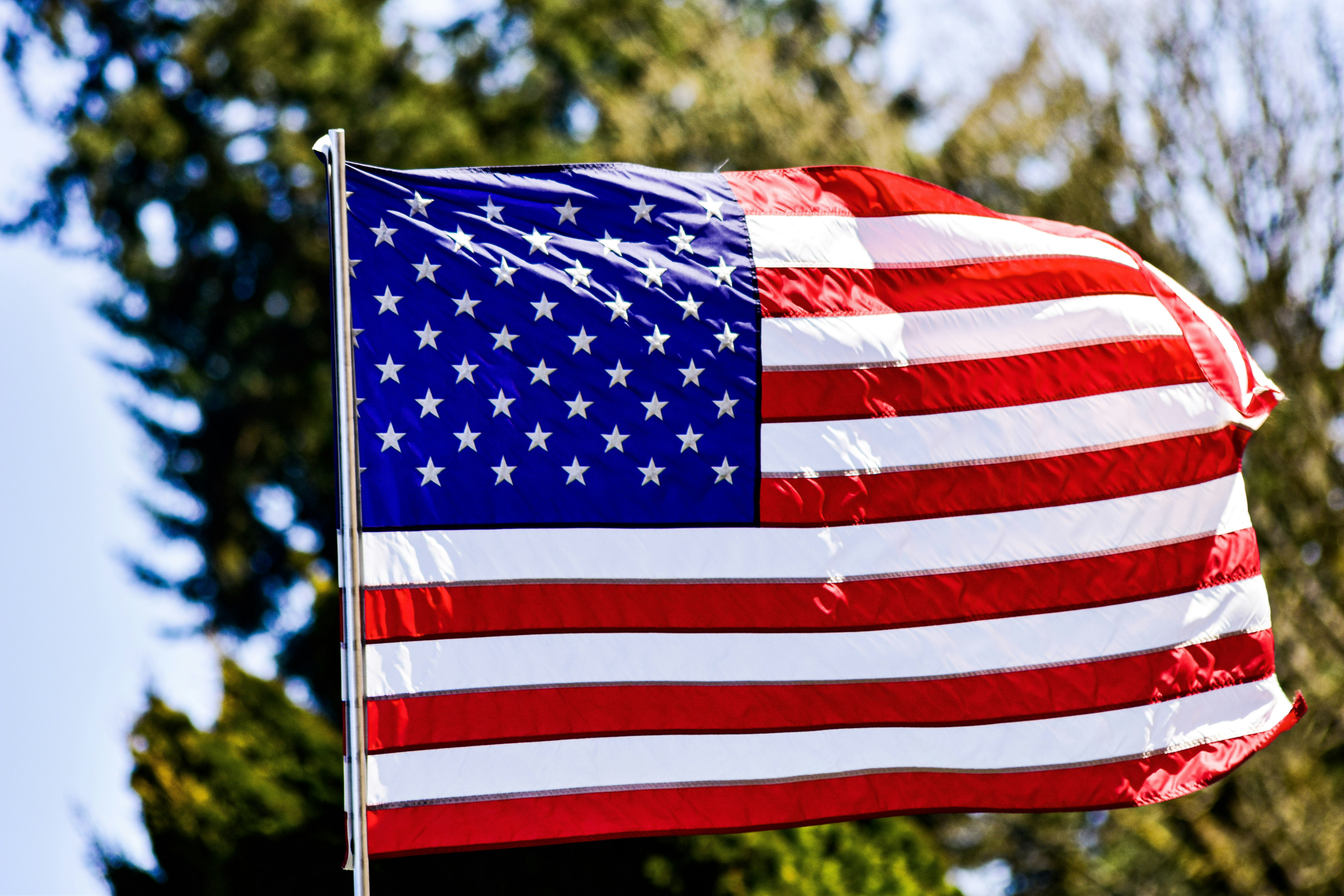 Us a flag on pole during daytime photo – Free American flag waving ...